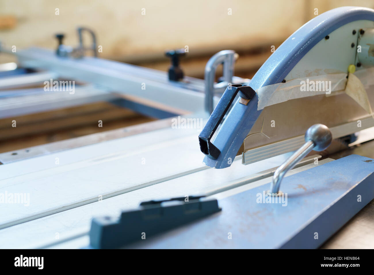 Equipment for chipboard edge production Stock Photo - Alamy