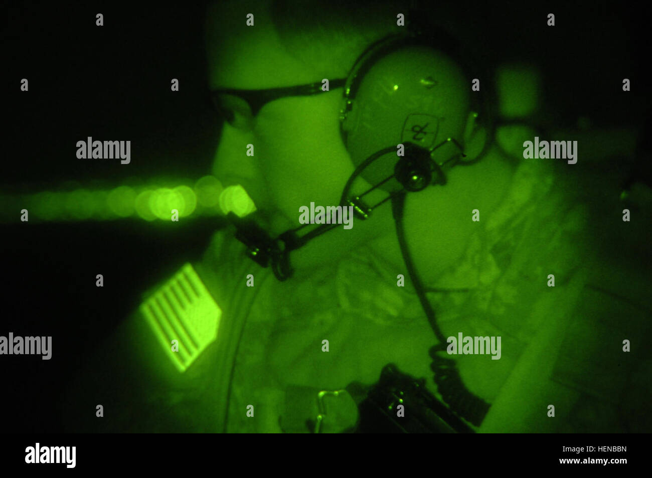 A U.S. Army psychological operations team prepares to drop ...