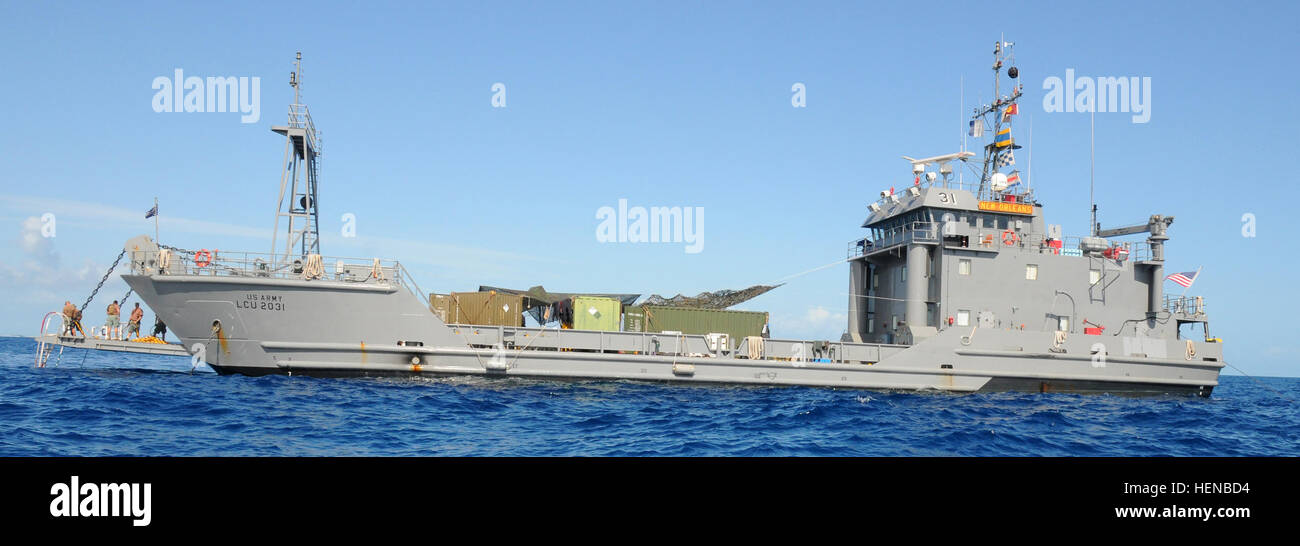 The U.S. Army Landing Craft Utility-New Orleans, anchored off the coast ...
