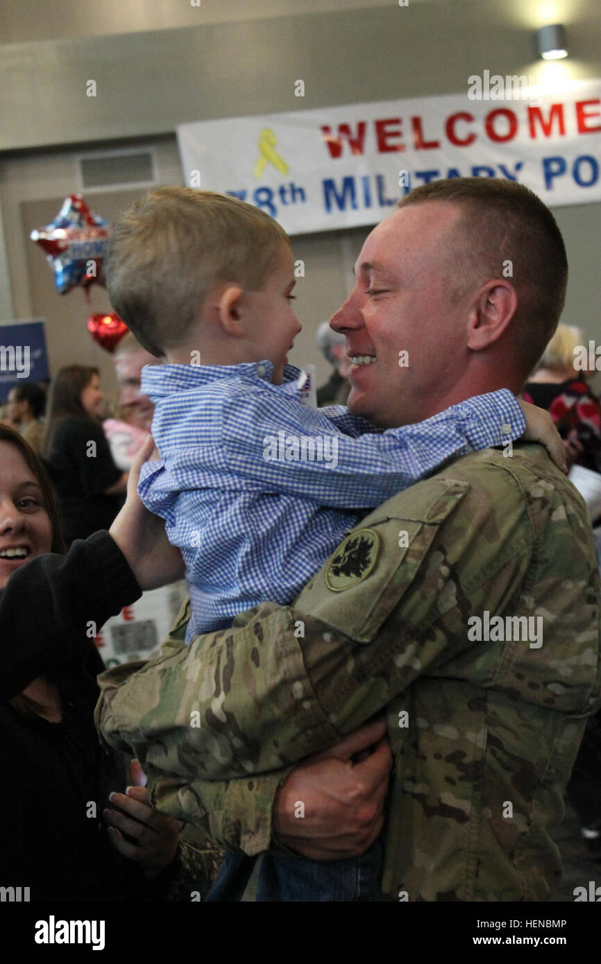 A Georgia Guardsman holds his son on Valentine's Day after the 278th ...