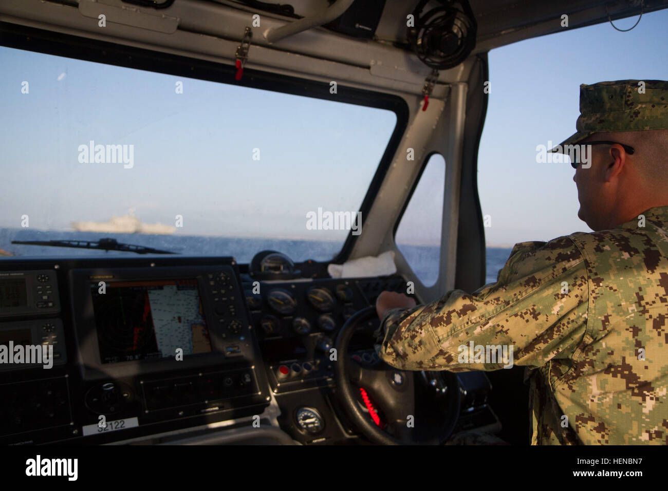 Coast Guard Chief Petty Officer with PSU 301 Zachary Taggart pilots a ...