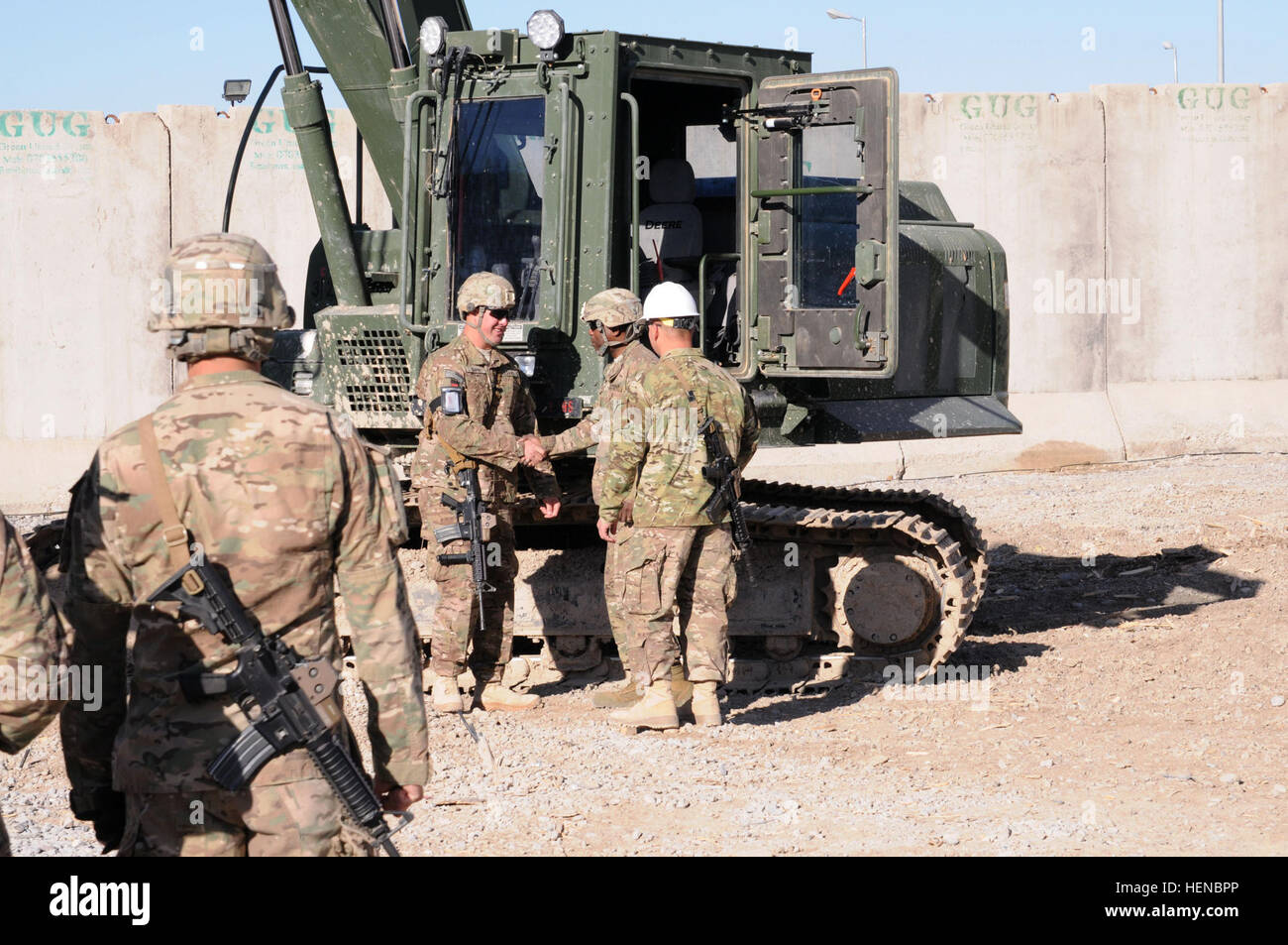 After learning how to operate a hydraulic excavator, Maj. Gen. Darrell ...