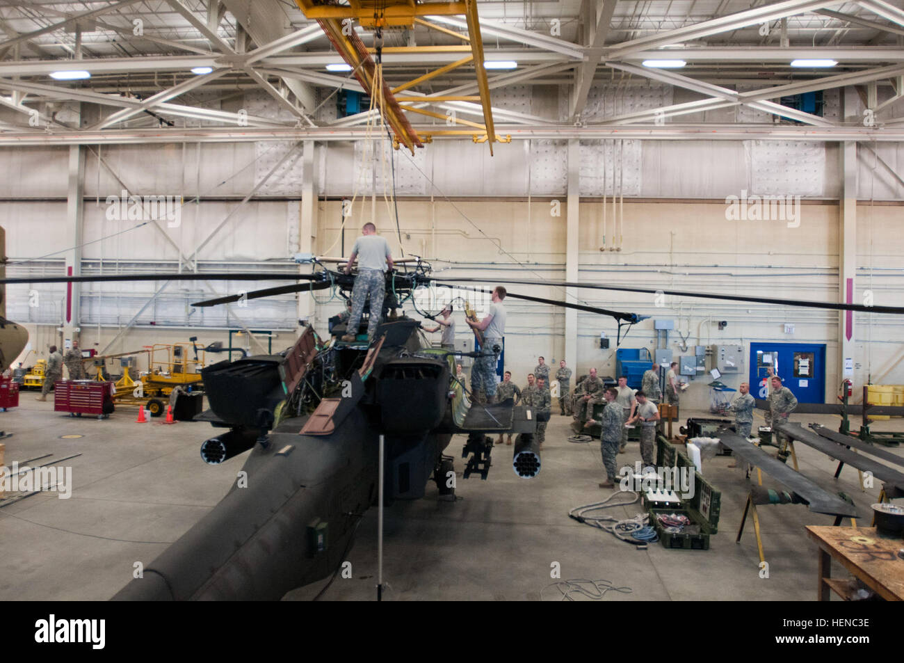 The 82nd Combat Aviation Brigade soldiers use the hoist in their hangar ...