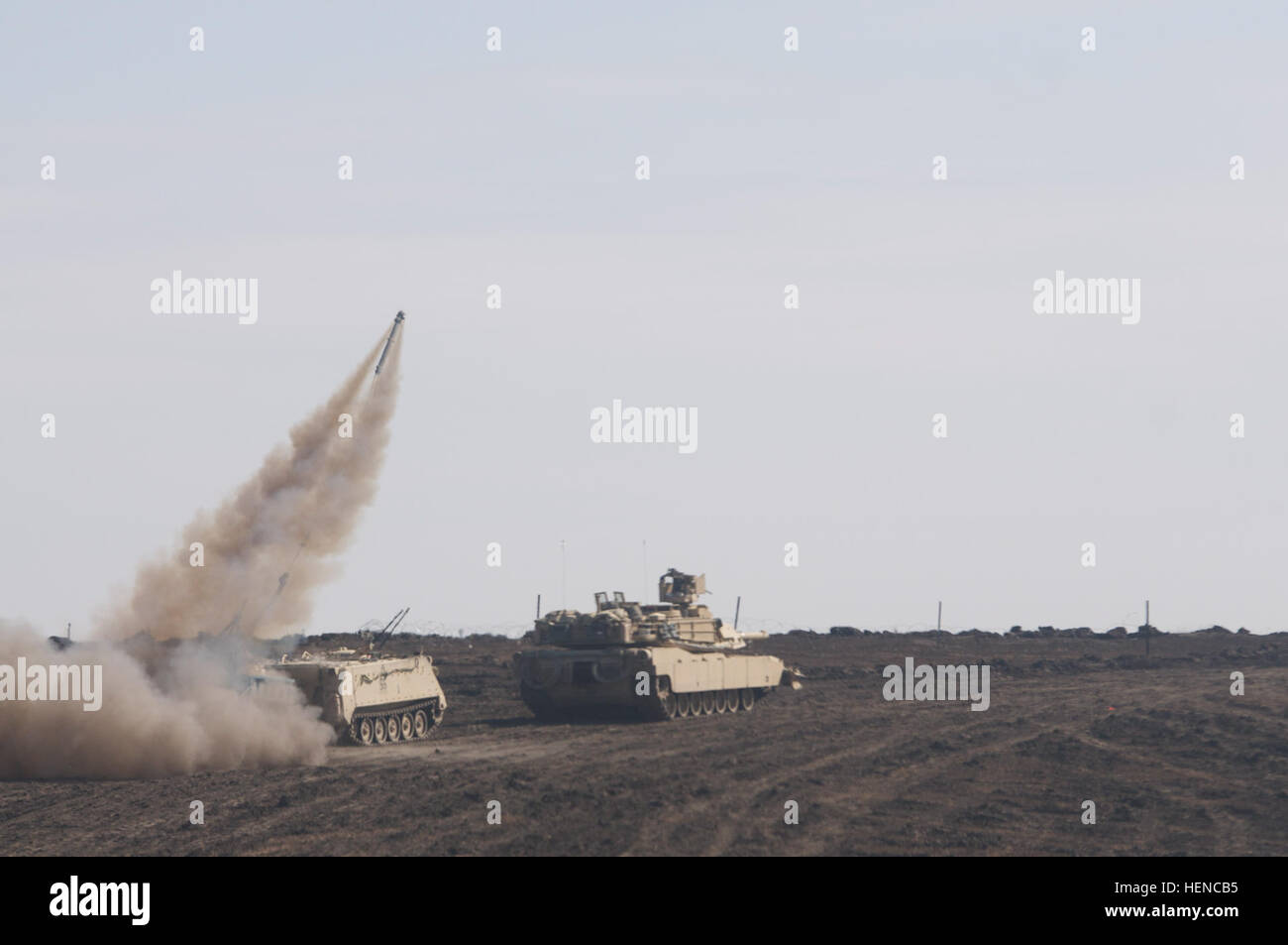 An M113 fires its mine clearing charge MK22 module 4 rocket from 111th ...