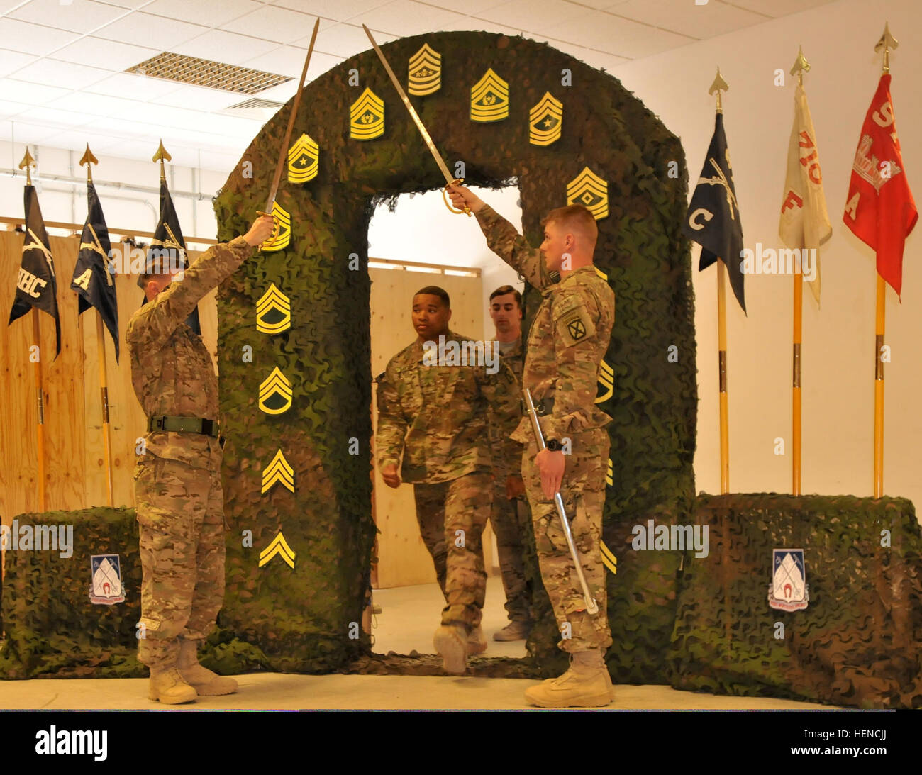 U.S. Army Sgt. William Bayton, center, with Headquarters and ...