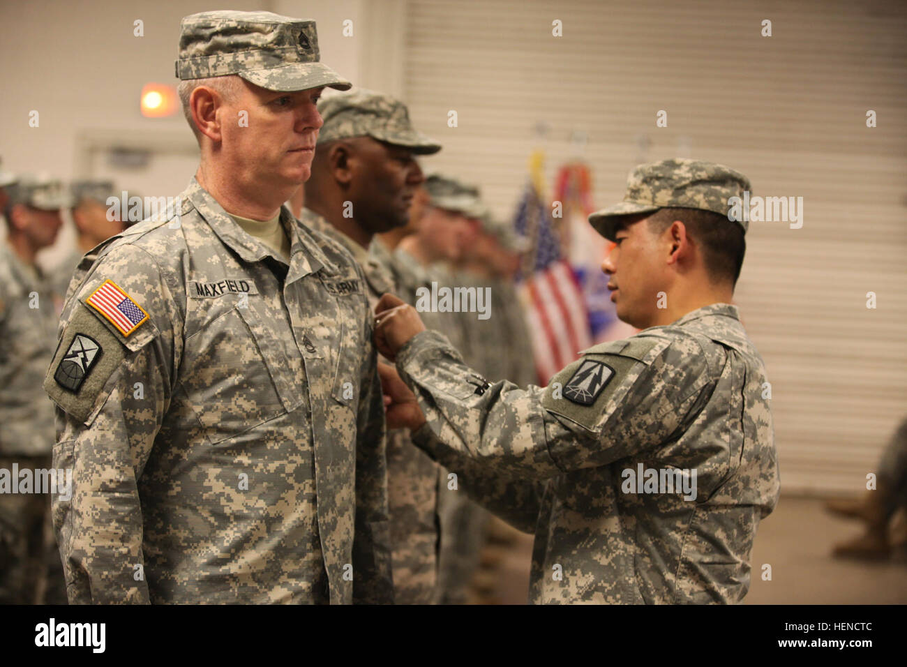 U.S. Army Brig. Gen. Garrett Sung Yee (right), incoming commanding ...