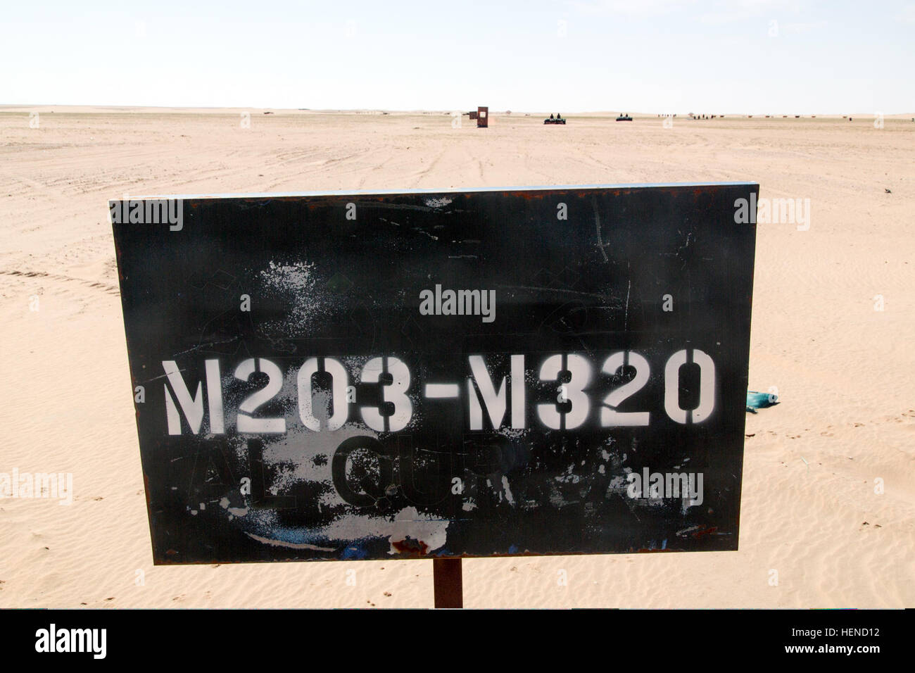 A sign marks the location for an M203 and M320 40 mm grenade launcher ...