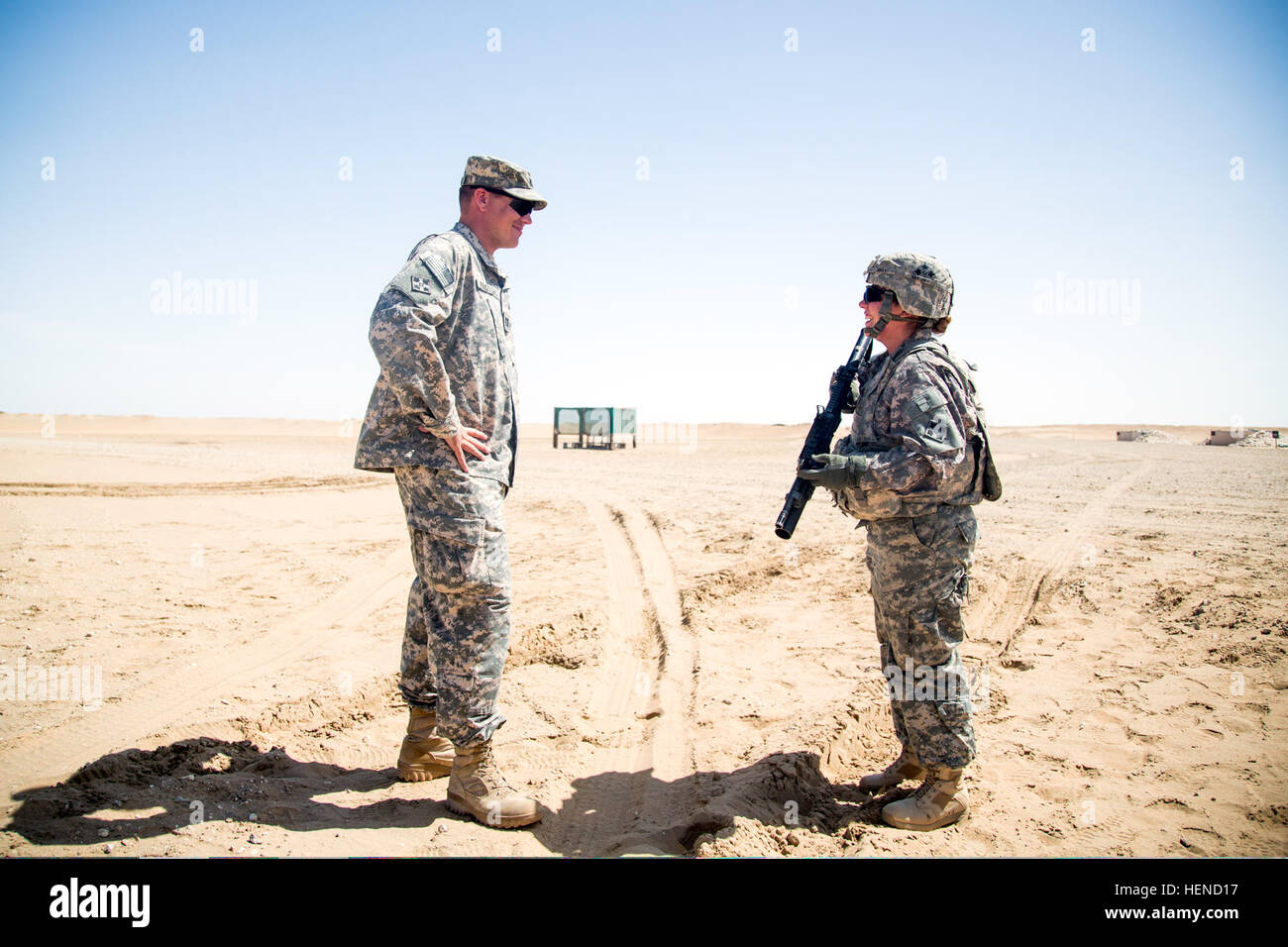 U.S. Army Spc. Nina Bray, right, an intelligence analyst with ...