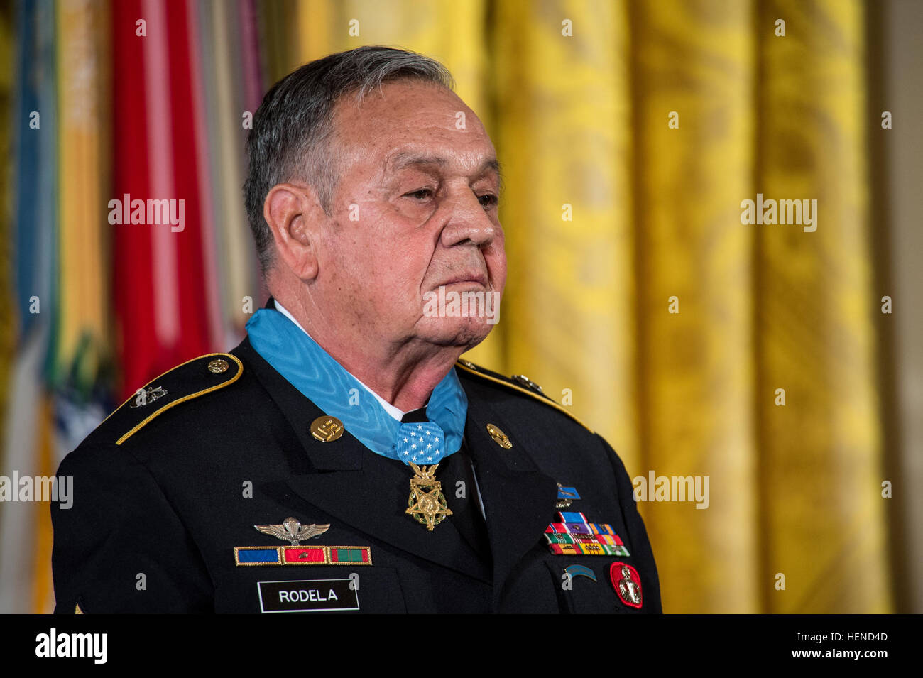 Former U.S. Army Master Sgt. Jose Rodela receives a Medal of Honor from ...