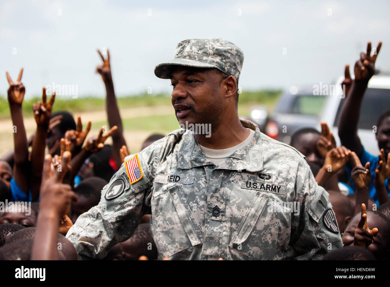 Cameroonian school children gather around U.S. Army Master Sgt. John ...