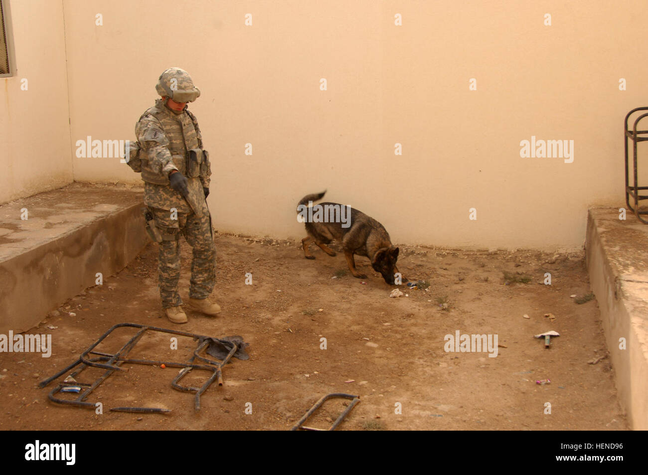 Sgt. Tim Kinsey and military working dog Jim search for possible ...