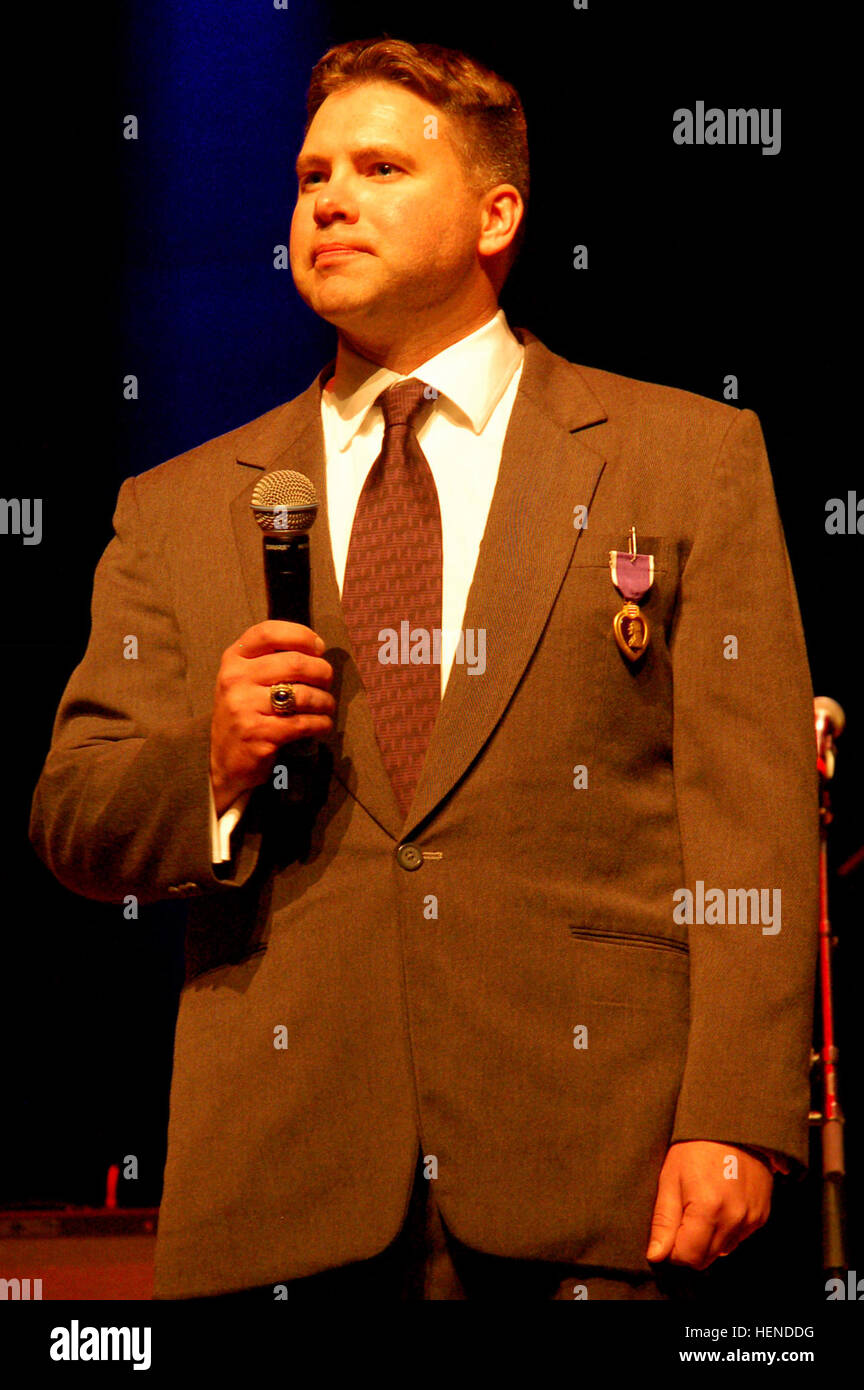 Photos By Rhonda Apple Army Maj. Ben Richards pauses during a standing ...