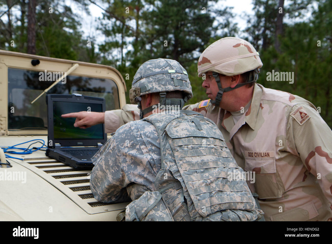 Brigade Logistics Support Team (BLST) Maj. Jason Cole and Mike Ahrens ...