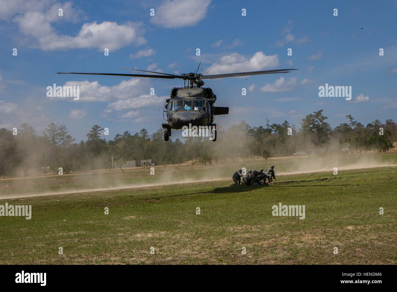 Soldiers of Company E, 3rd Combat Aviation Brigade, prepare to rescue a ...