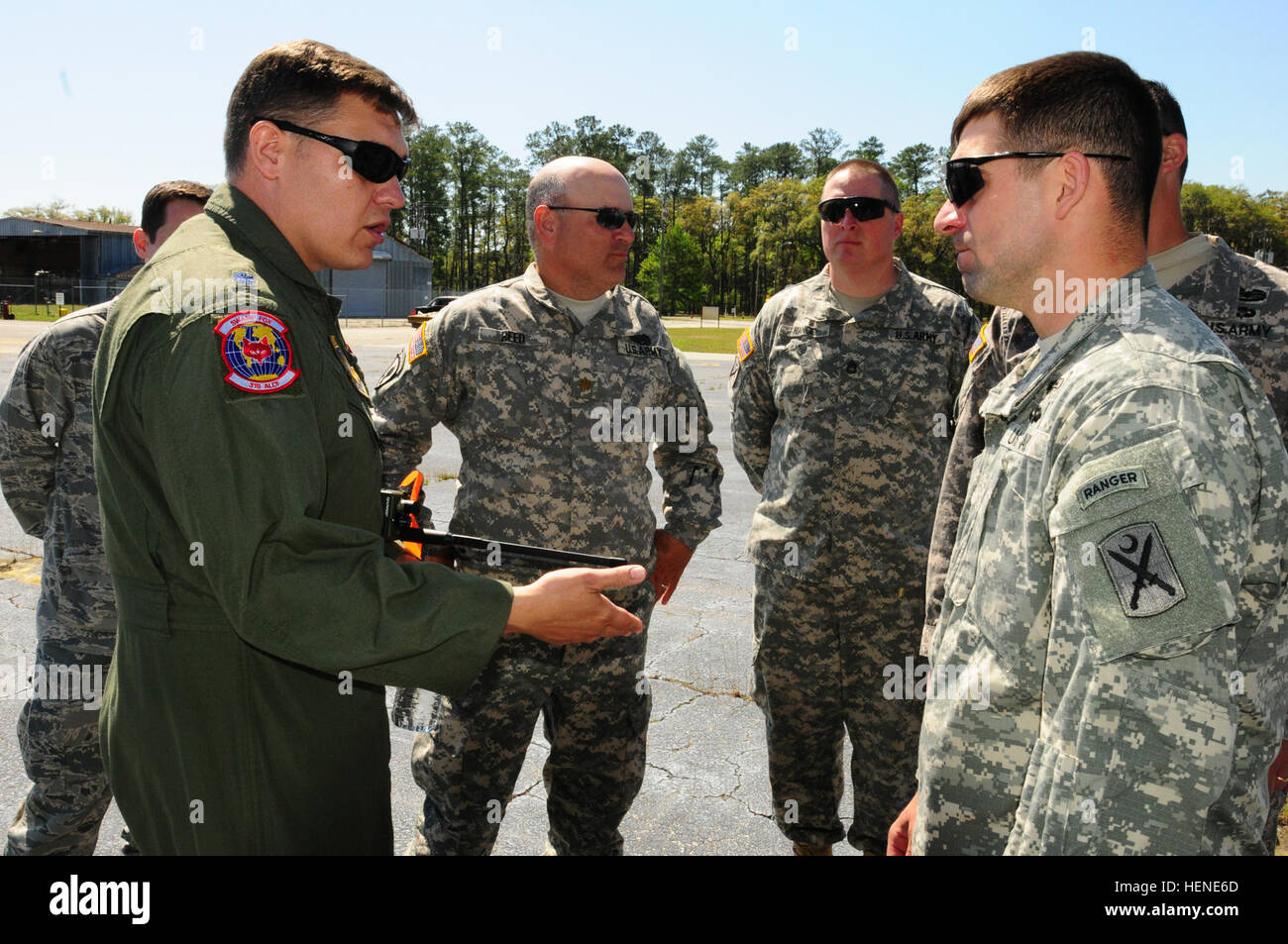 U.S. Air Force Lt. Col. Lamar Thigpen (left), ground commander for the ...