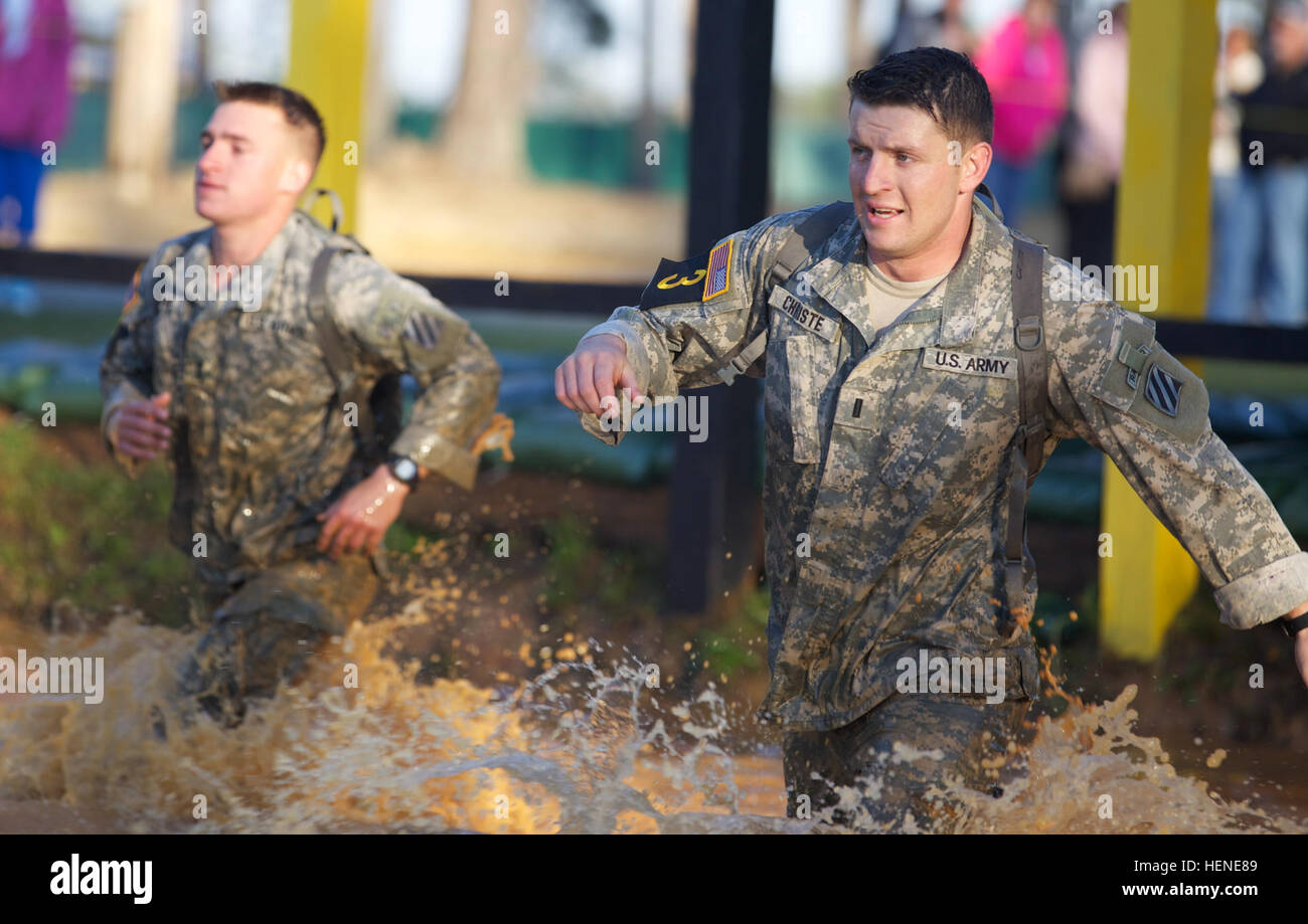 U.S. Army 1st Lt. Julian Christe (right) and 1st Lt. Matthew Burke ...