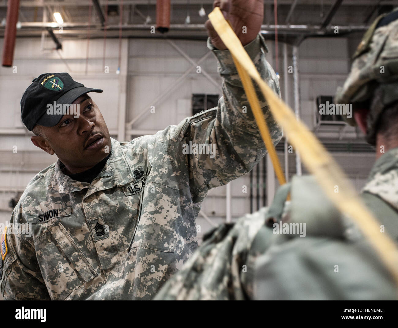 U s army jumpmaster inspects parachute hi-res stock photography and ...