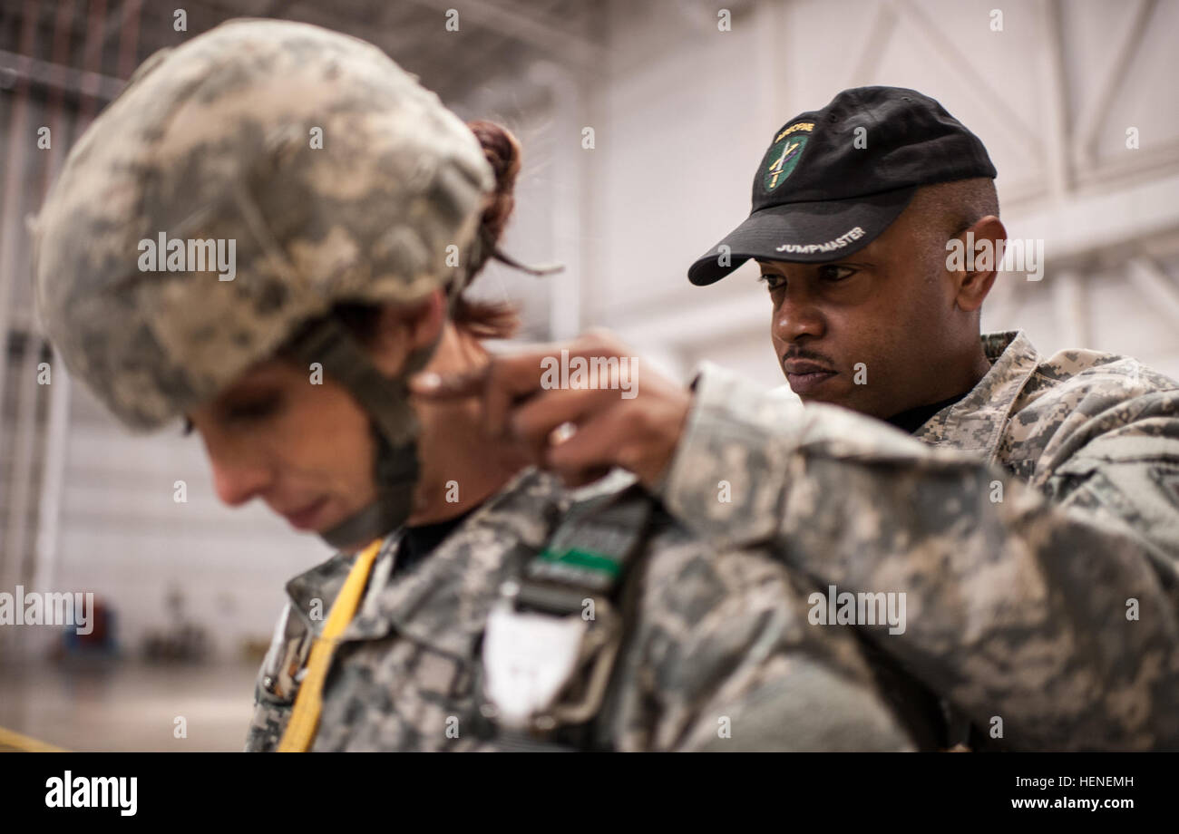 U s army jumpmaster inspects parachute hi-res stock photography and ...