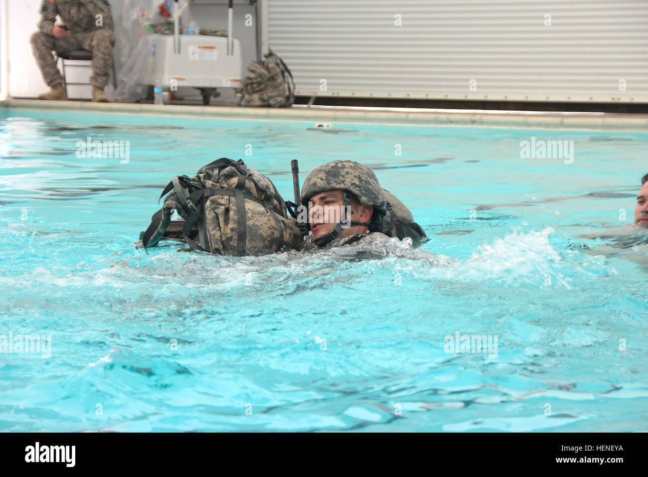 A U.S. Army Soldier from the 1st Training Brigade completes a pool swim ...