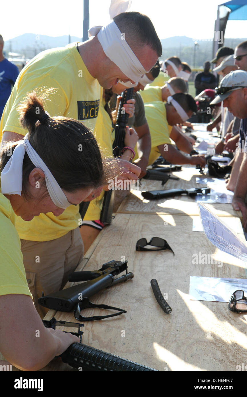 After running 100 yards, competitors of the GTMO Amazing Race were ...