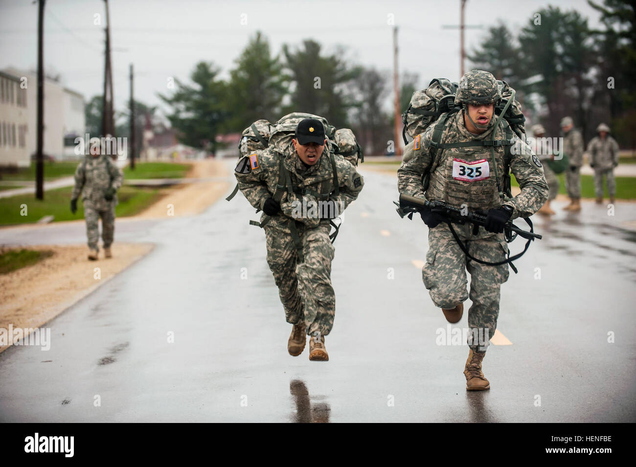 Spc. Rahman Gholston (right), of Pullman, Washington, an air defense ...