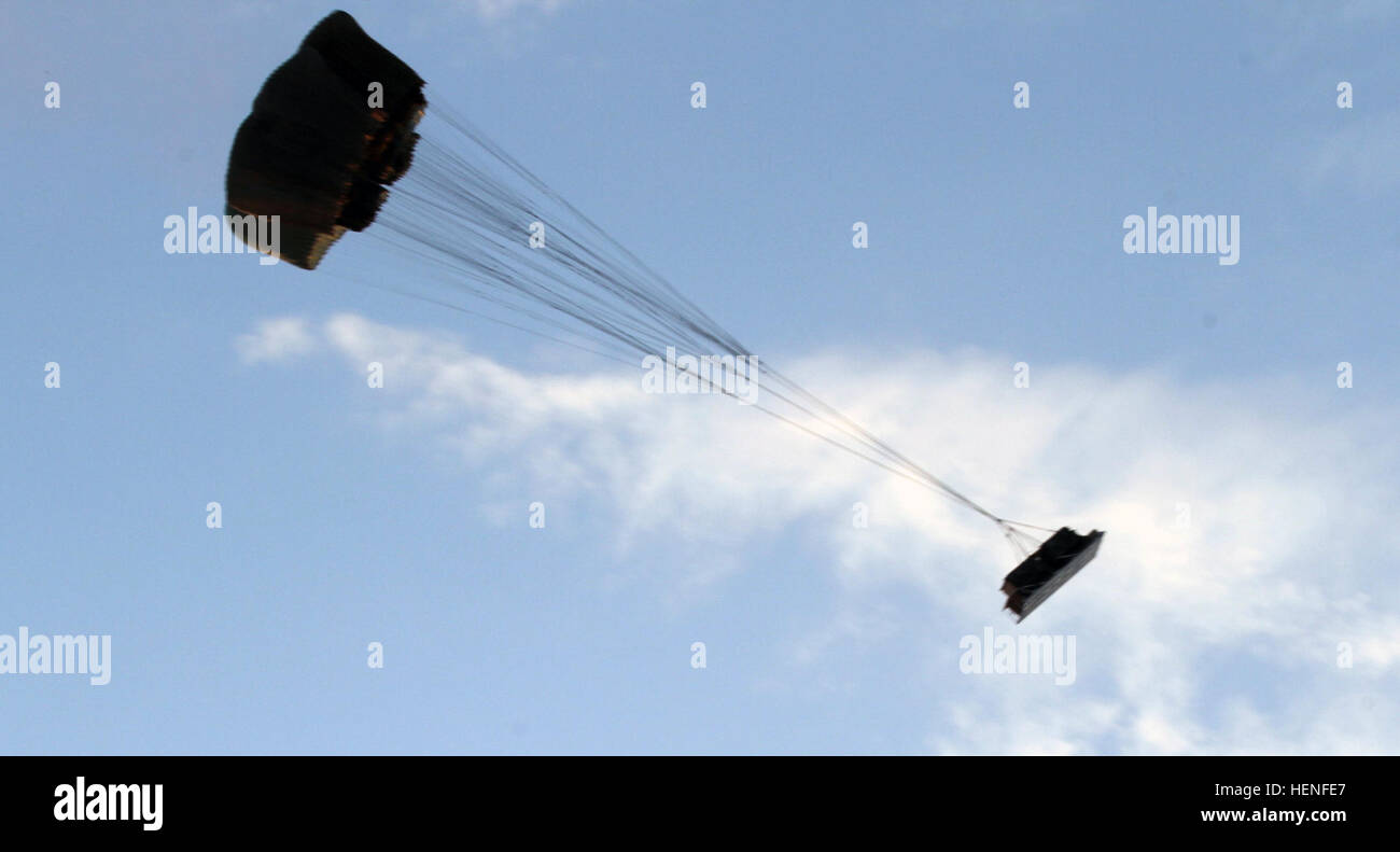 A Small Unit Support Vehicle is released from C17 Globemaster III above ...