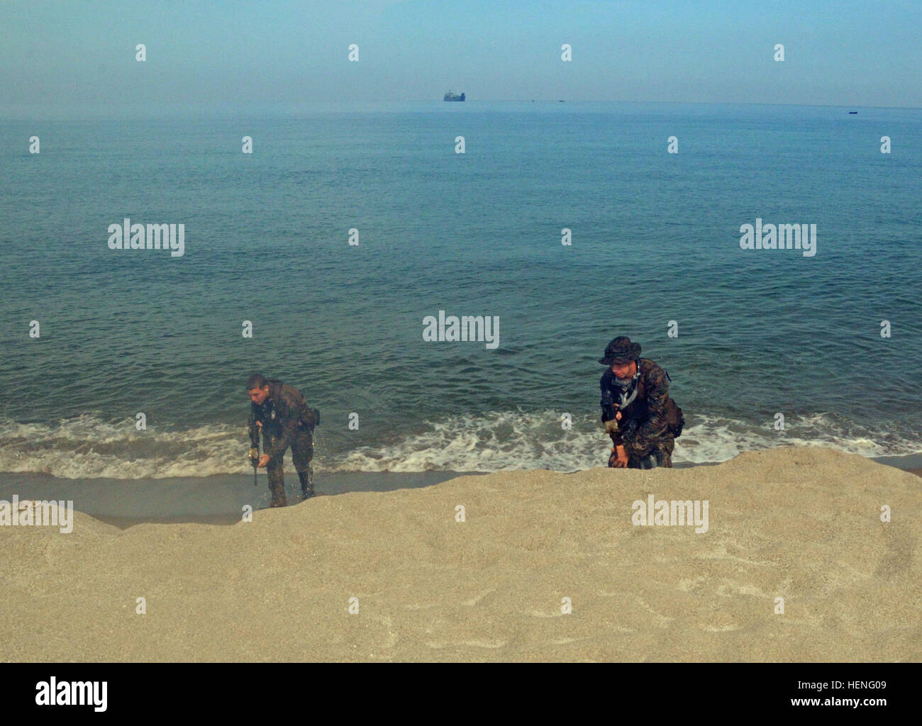 U.S. Marines from 3rd Reconnaissance Battalion practice securing a ...