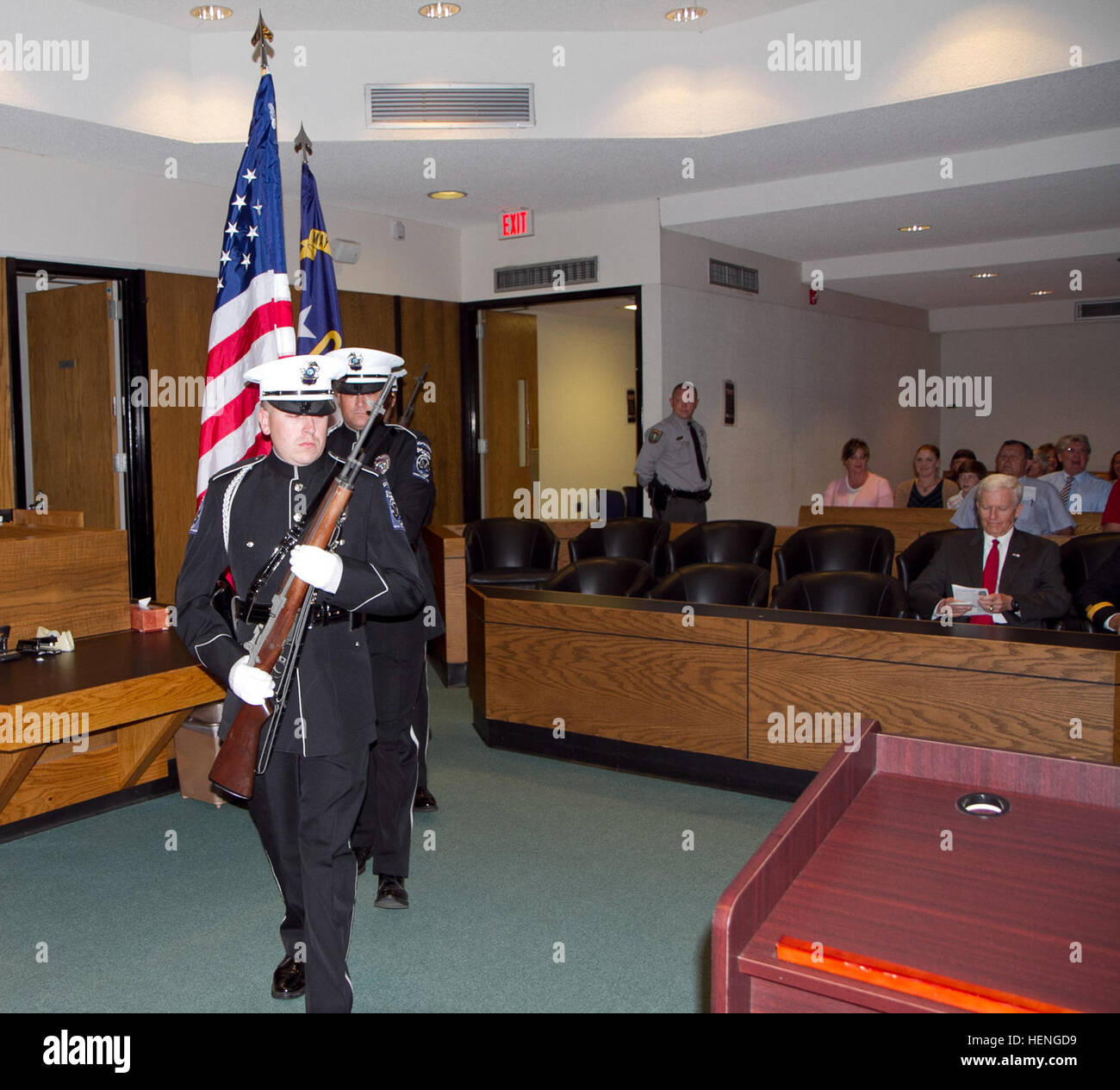 The Mooresville Police Department Color Guard enters the court room ...
