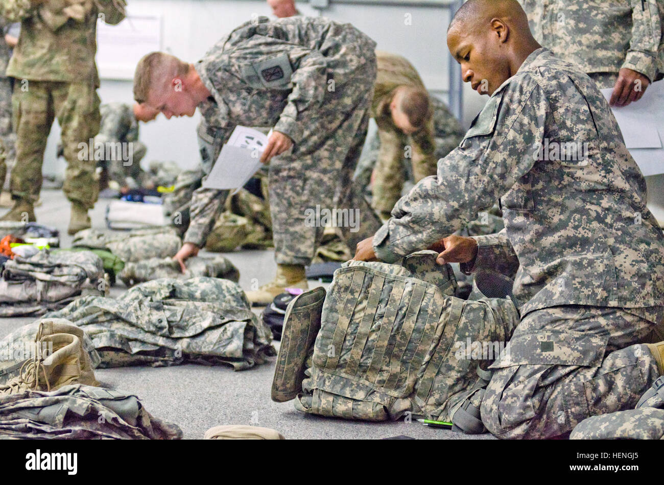 Soldiers and noncommissioned officers display their required items for ...
