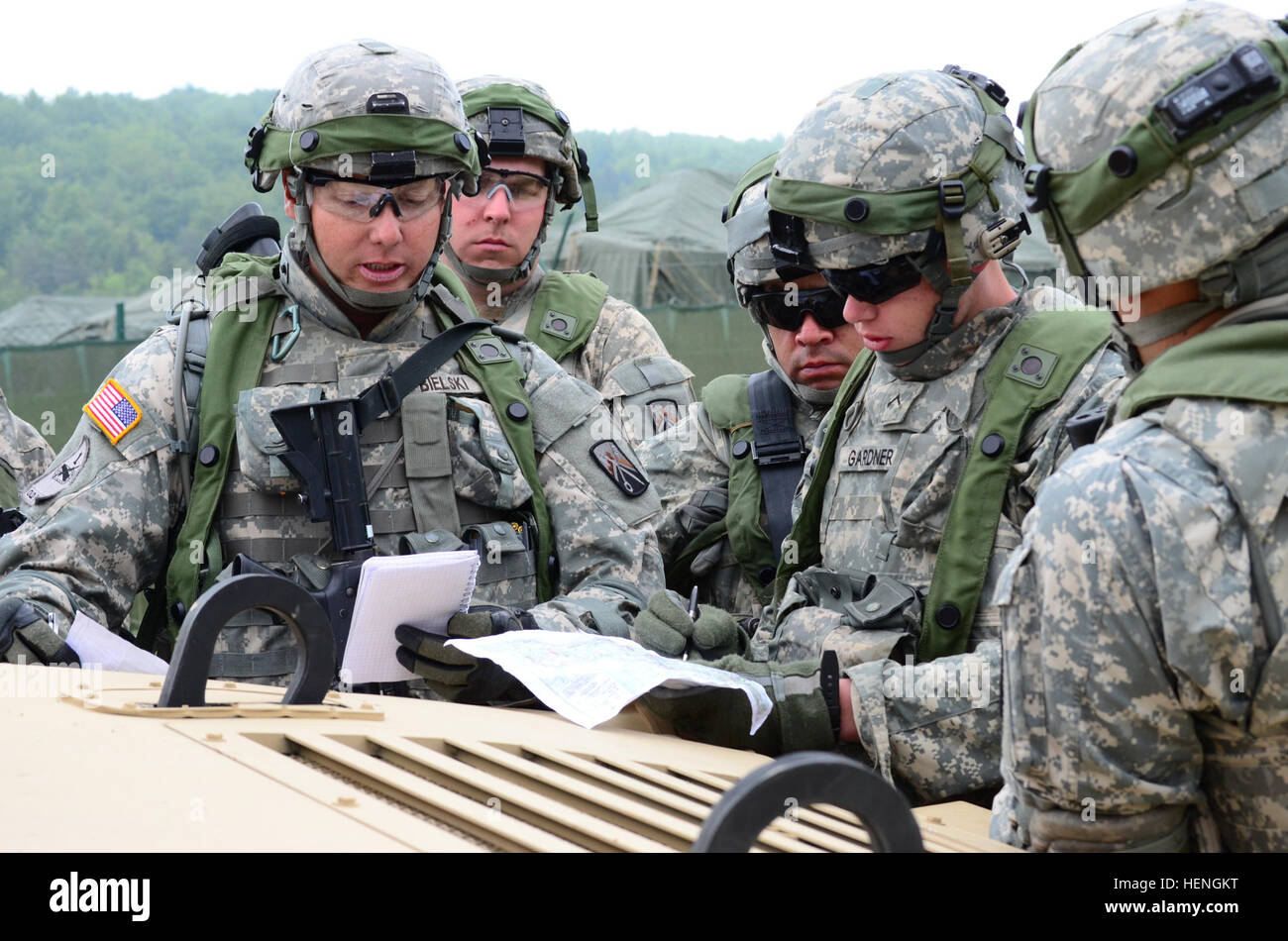 U.S. Army Sergeant Jason Bielski, left, of 18th Combat Sustainment ...