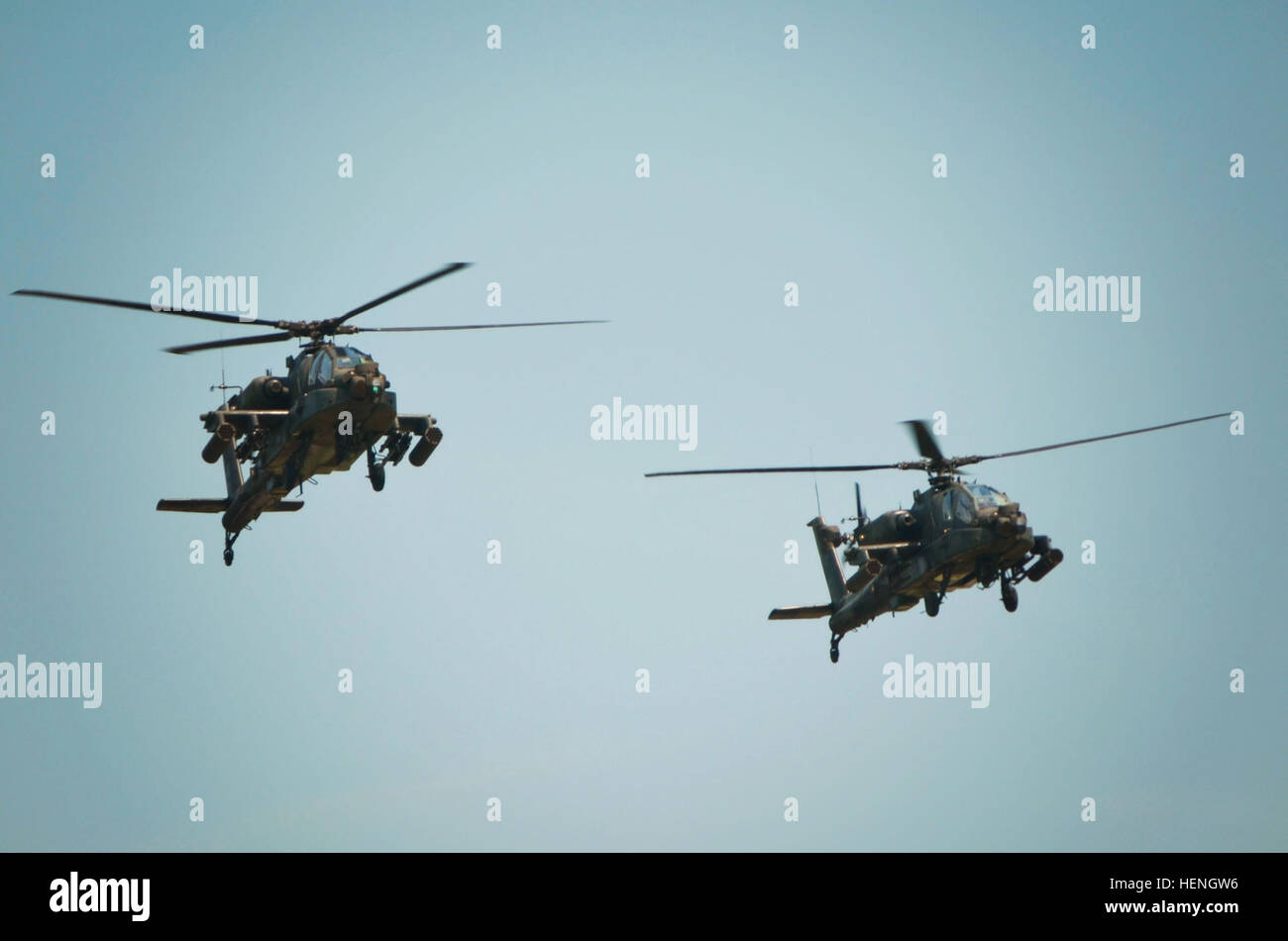 Two Apache Helicopters pass over the parade field during the closing of ...