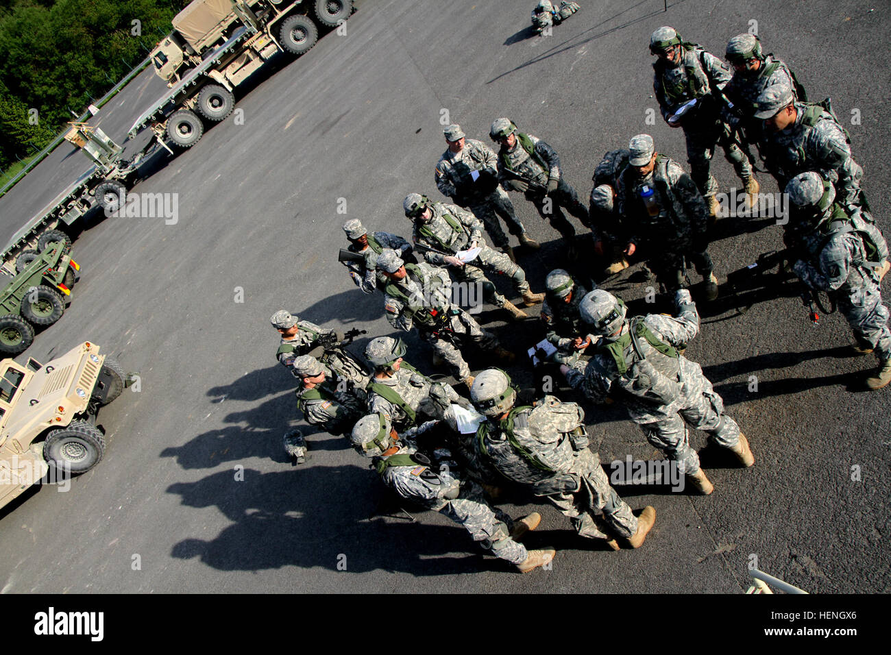 Convoy Commander, 2nd Lt. Stephanie Hasenfus briefs her crew members on ...