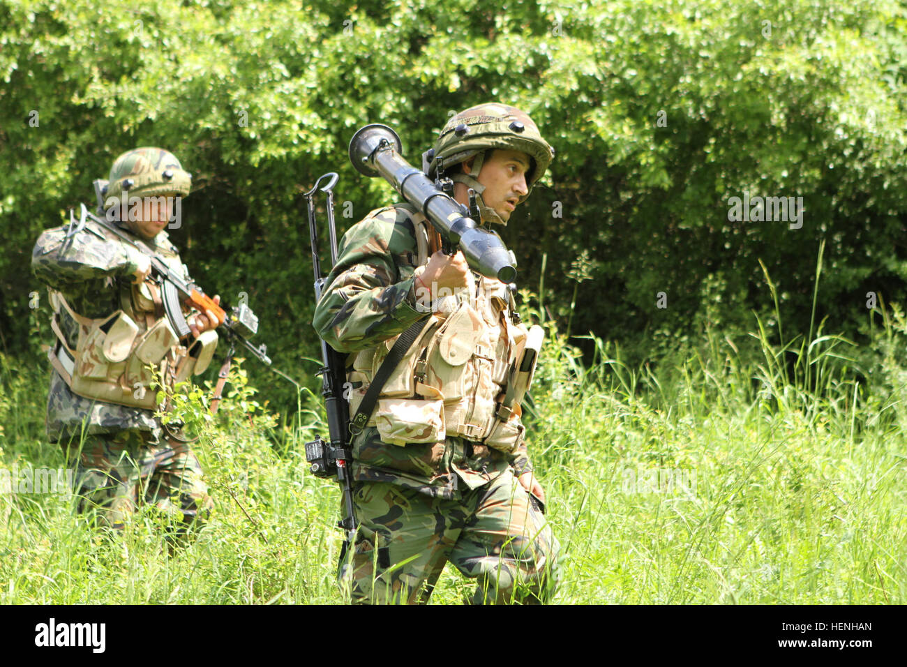 After destroying an enemy tank, Bulgarian infantrymen move to a new ...