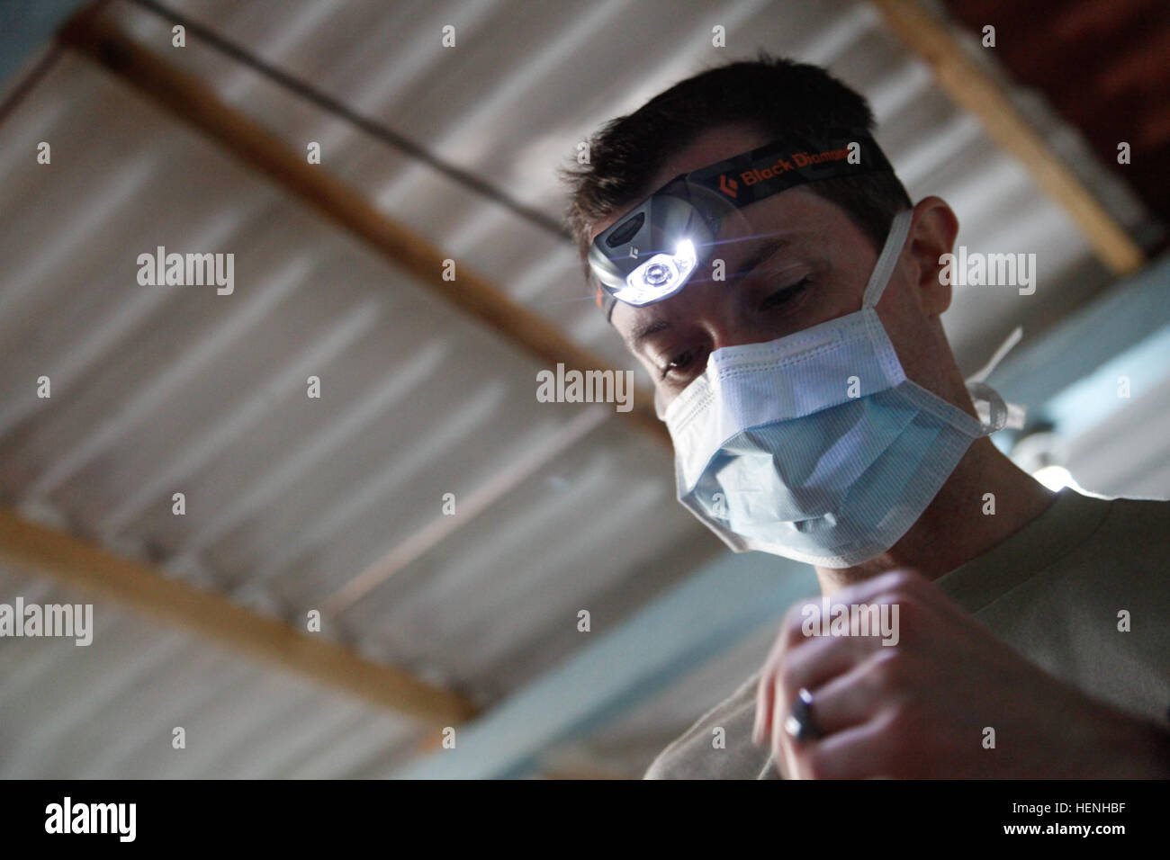 U.S. Army Capt. David Ryan, of the Arizona Medical Detachment, prepares ...