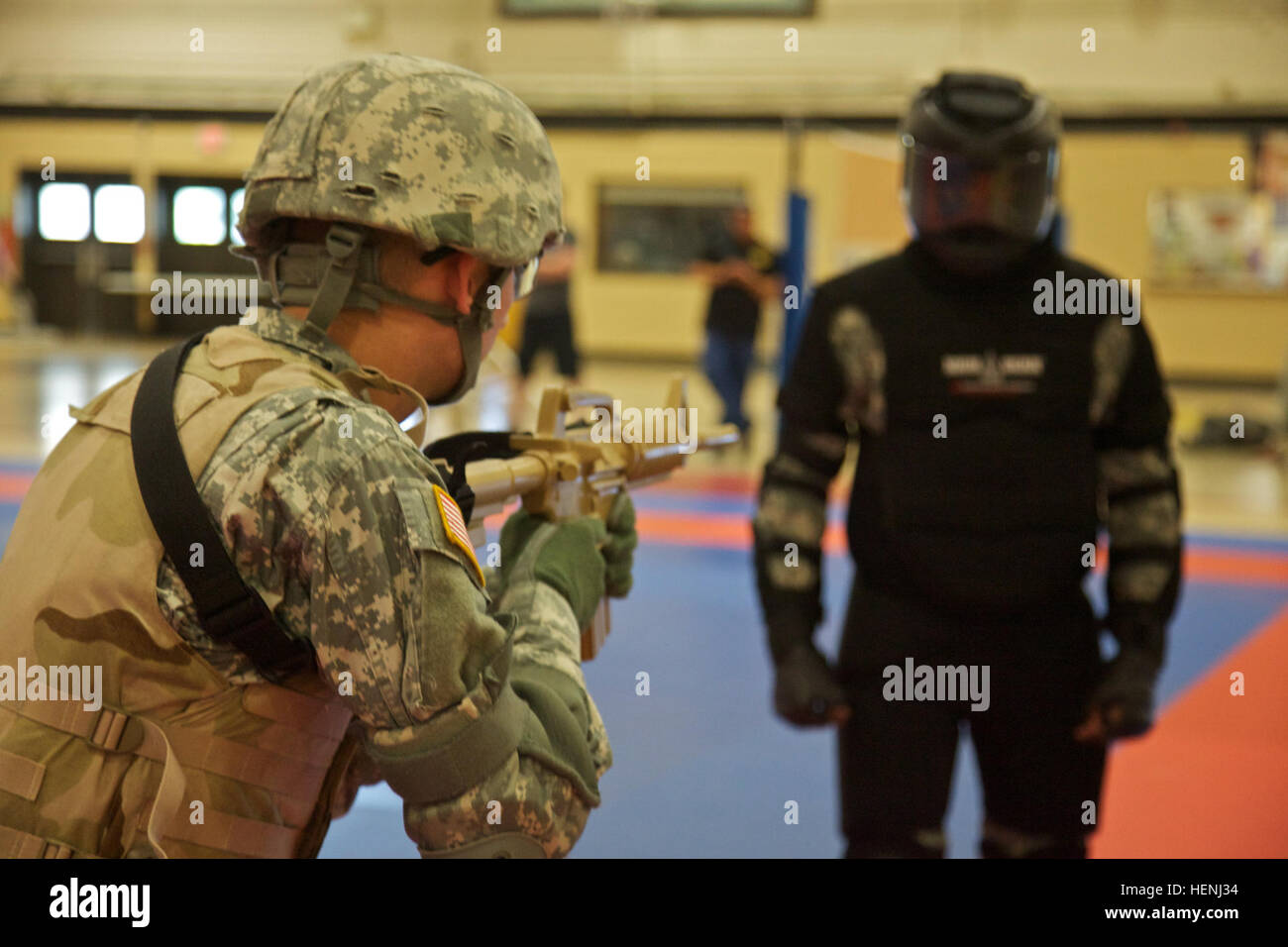 A U.S. Army soldier from the 130th Chemical Company practices holding ...