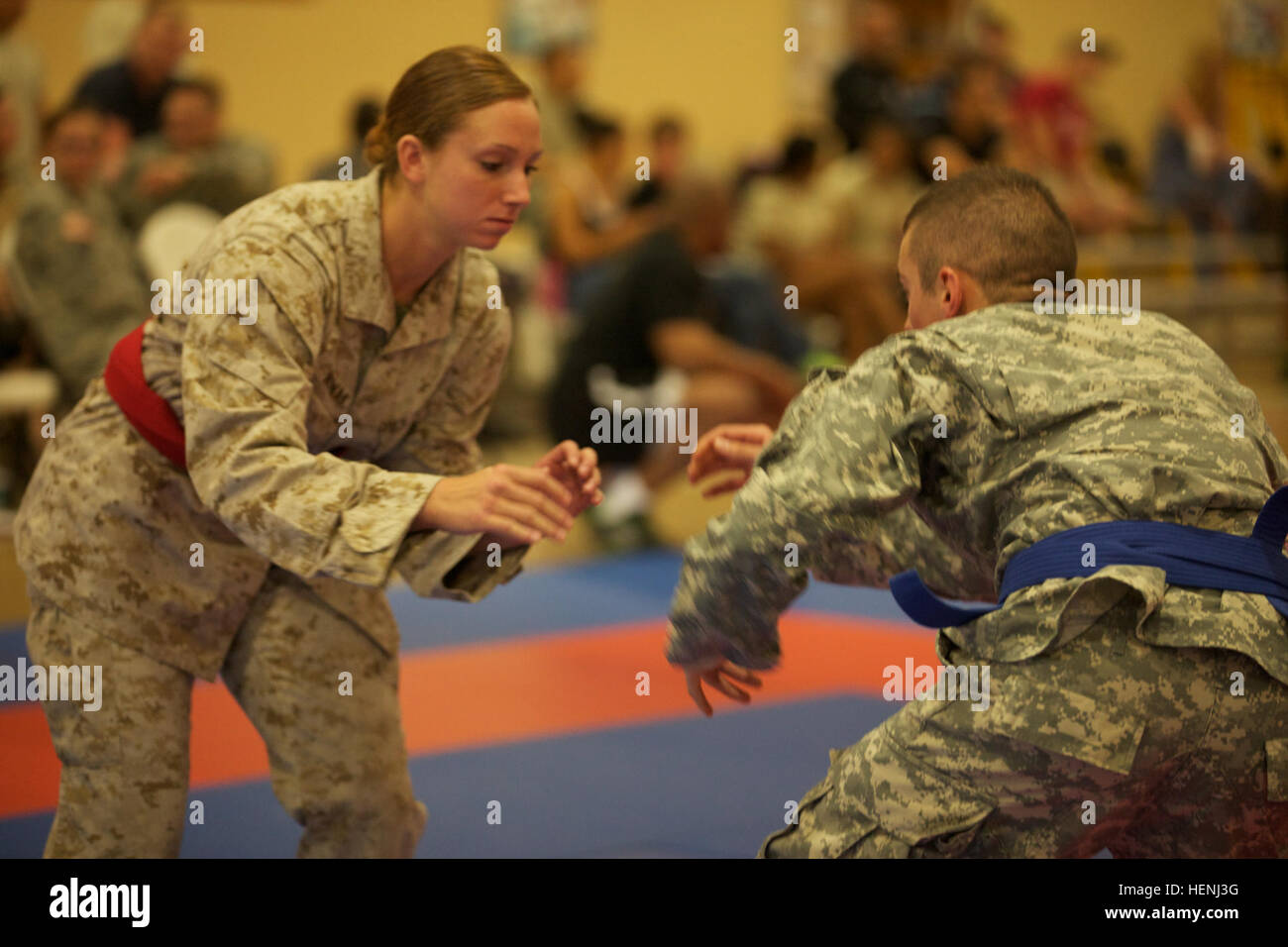 A U.S. Army Soldier and U.S. Marine fight head to head during an Army ...