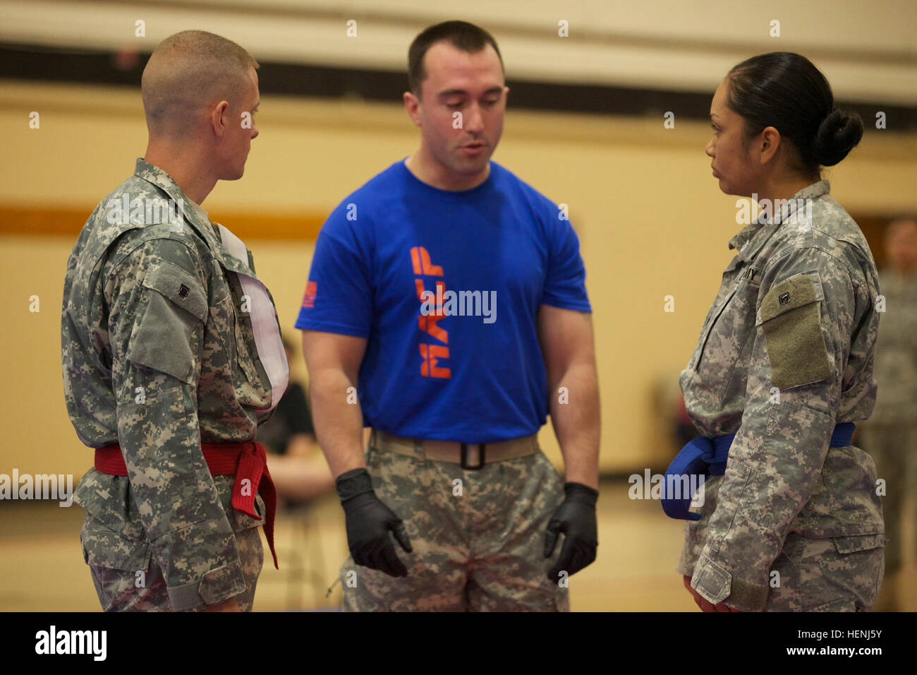 Two U.S. Army Soldiers listen as a referee explains the rules before a ...