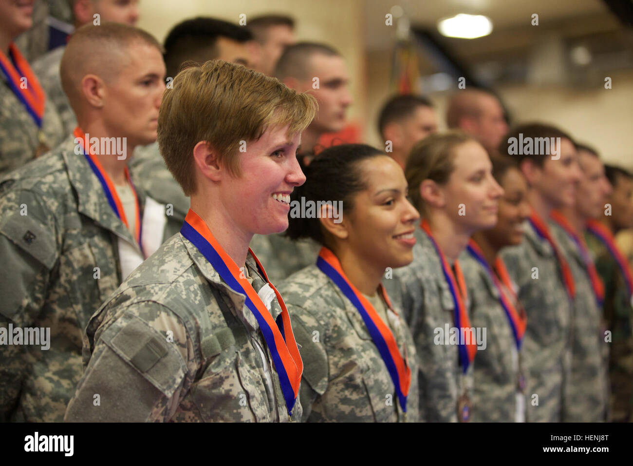 A group of U.S. Army Soldiers, Air Force Airmen, and U.S. Marines stand ...
