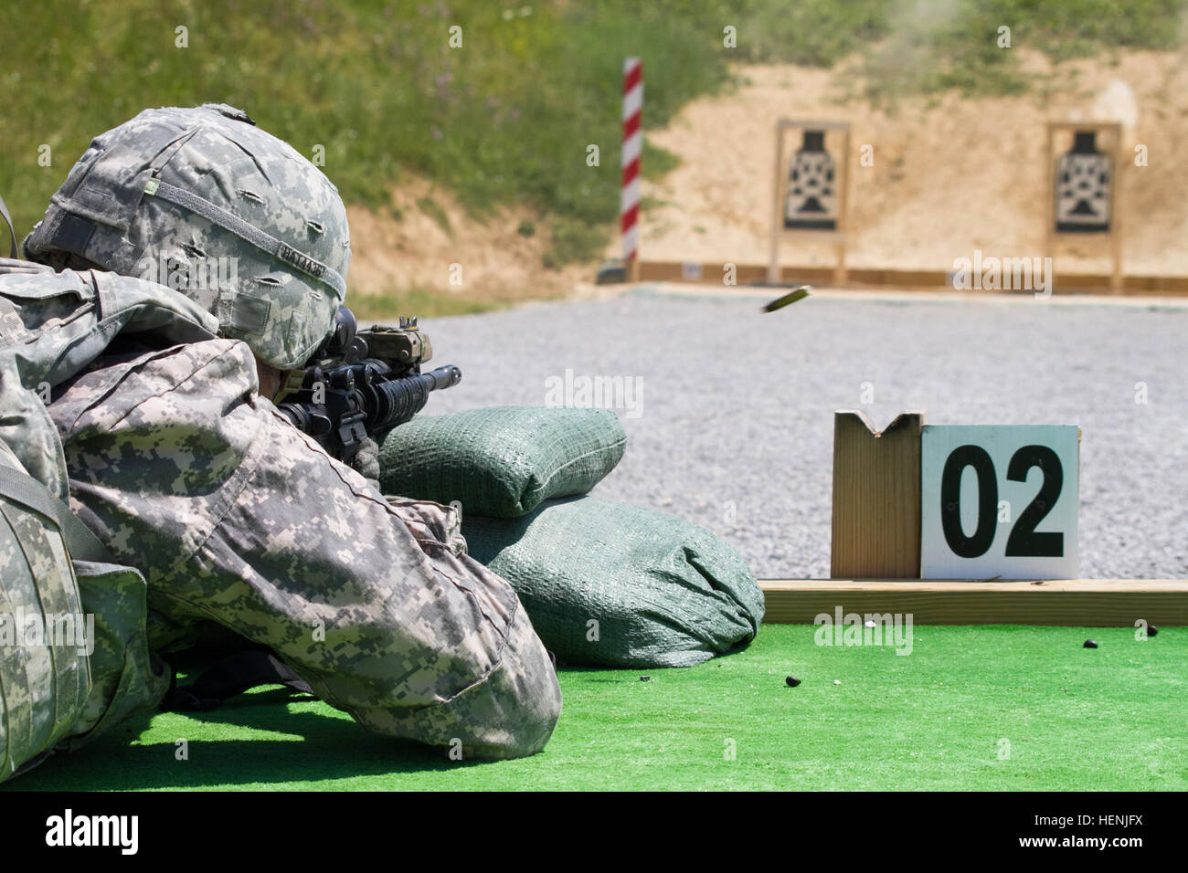 A Soldier with 2nd Squadron, 38th Cavalry Regiment, fires the M4 rifle ...