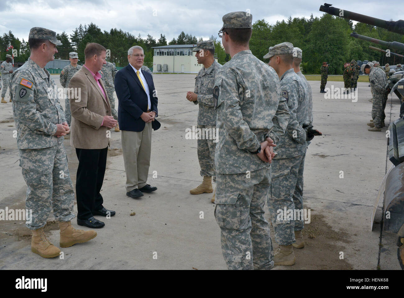 U.S. Army Gen. Carter Ham (ret.) (third from left) and former Sgt. Maj ...