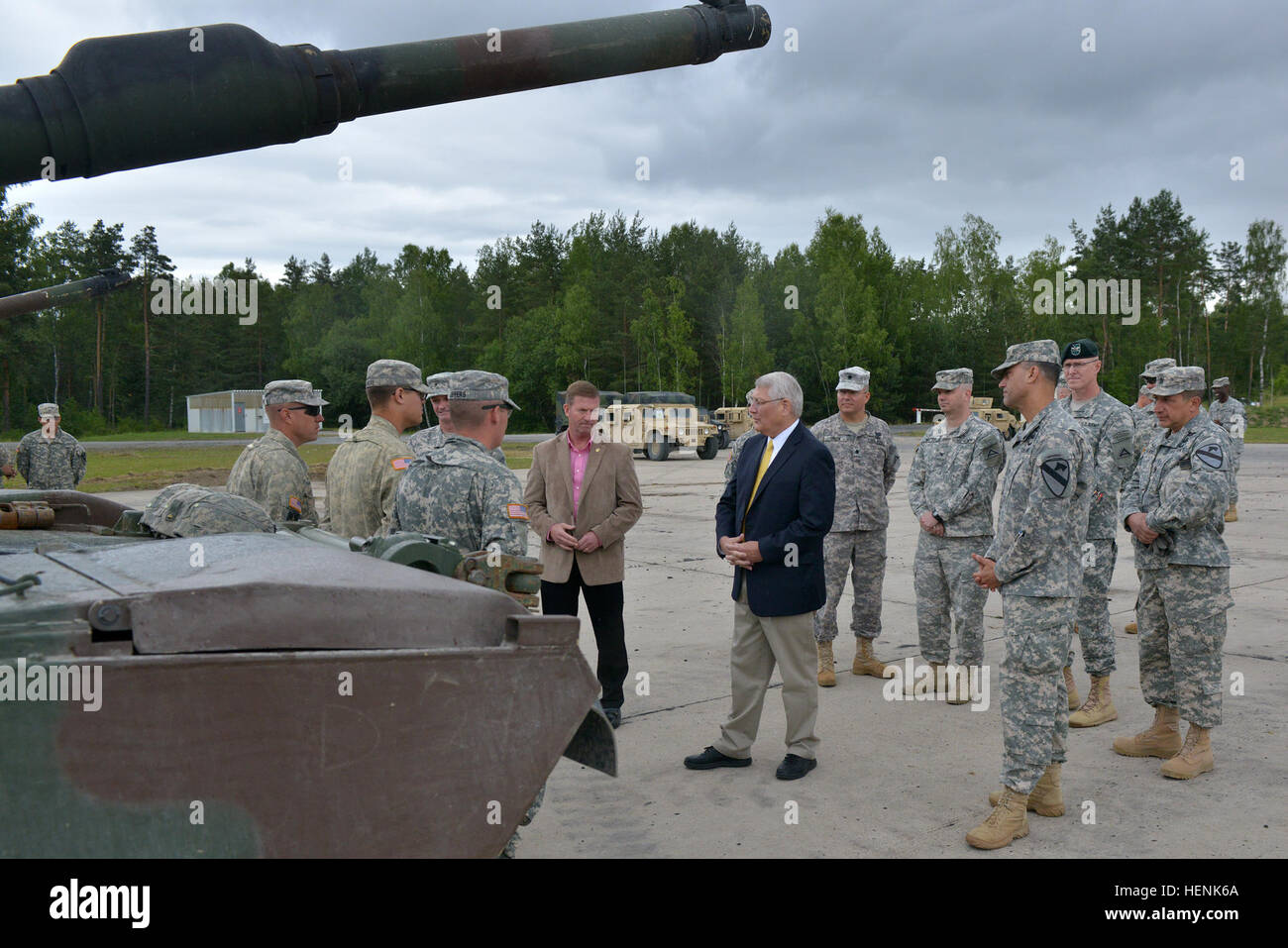 U.S. Army Gen. Carter Ham (ret.) (civilian right) and former Sgt. Maj ...