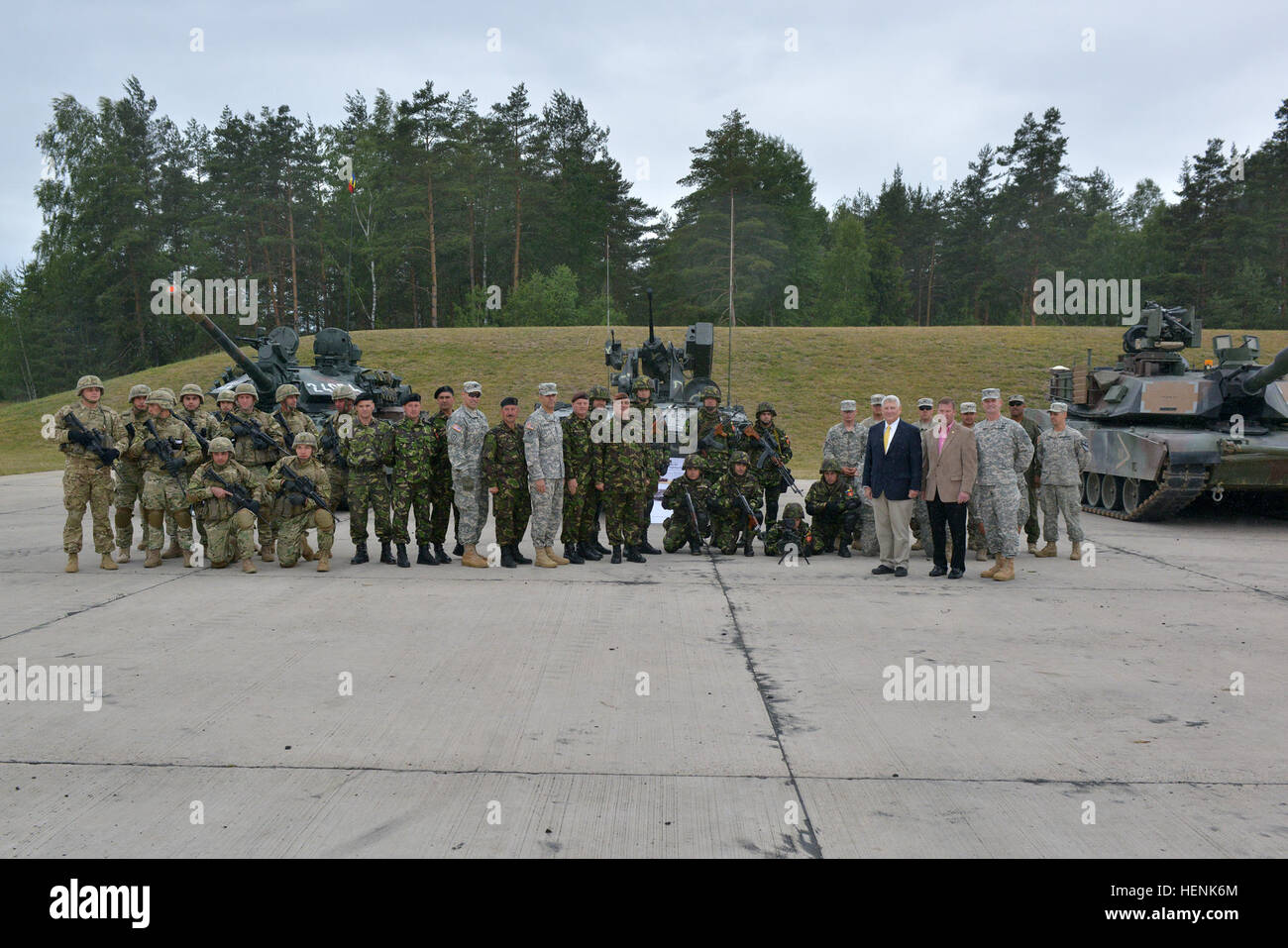 U.S. Army Gen. Carter Ham (ret.) (civilian left) and former Sgt. Maj ...