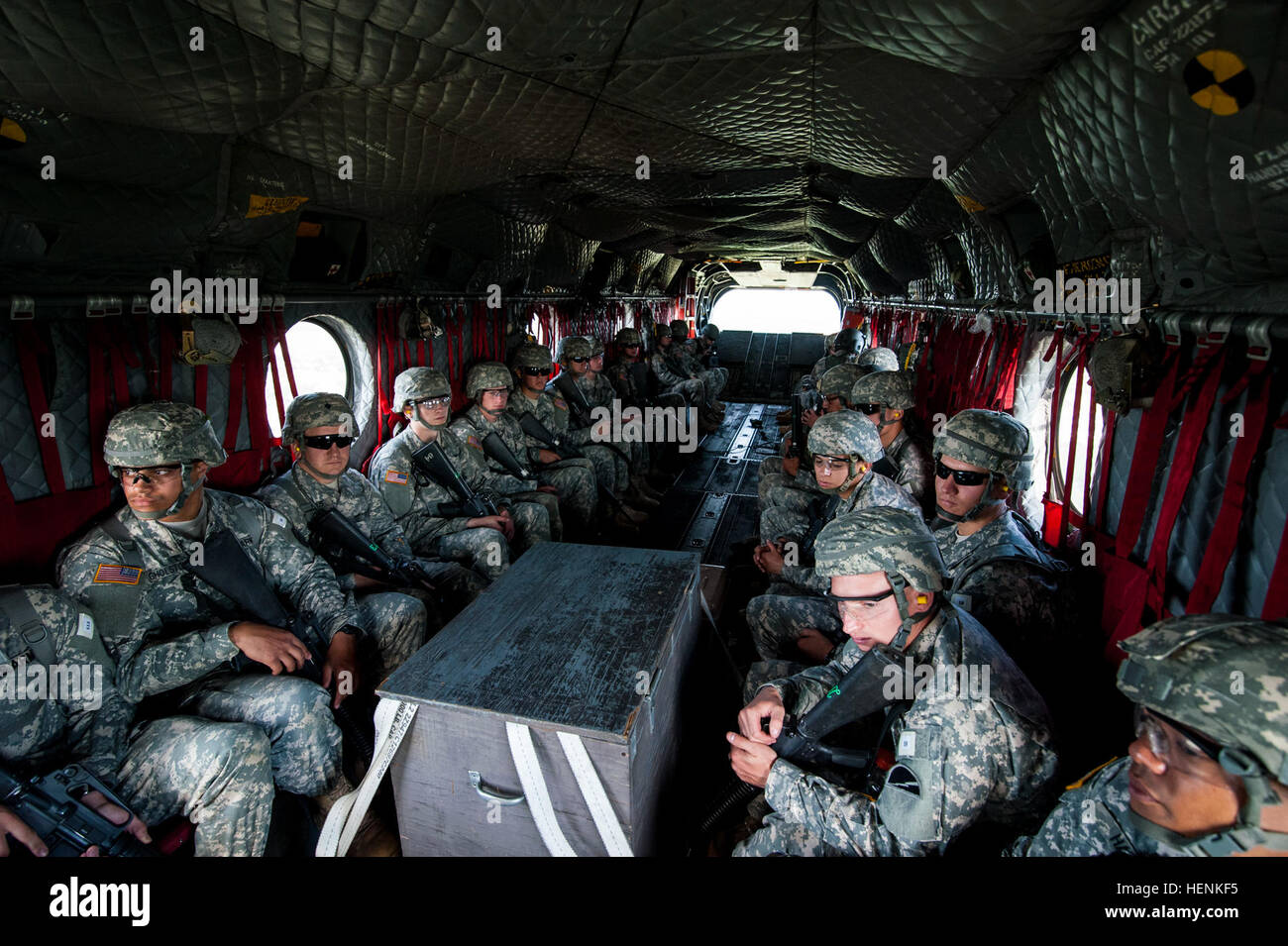 Soldiers ride on a CH-47 Chinook helicopter as part of the 2014 Army ...