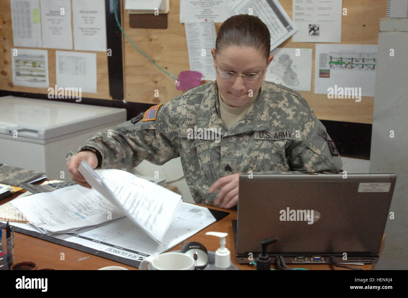 Sgt. Catherine Hamel, a Queens, N.Y., native, finishes paperwork to ...