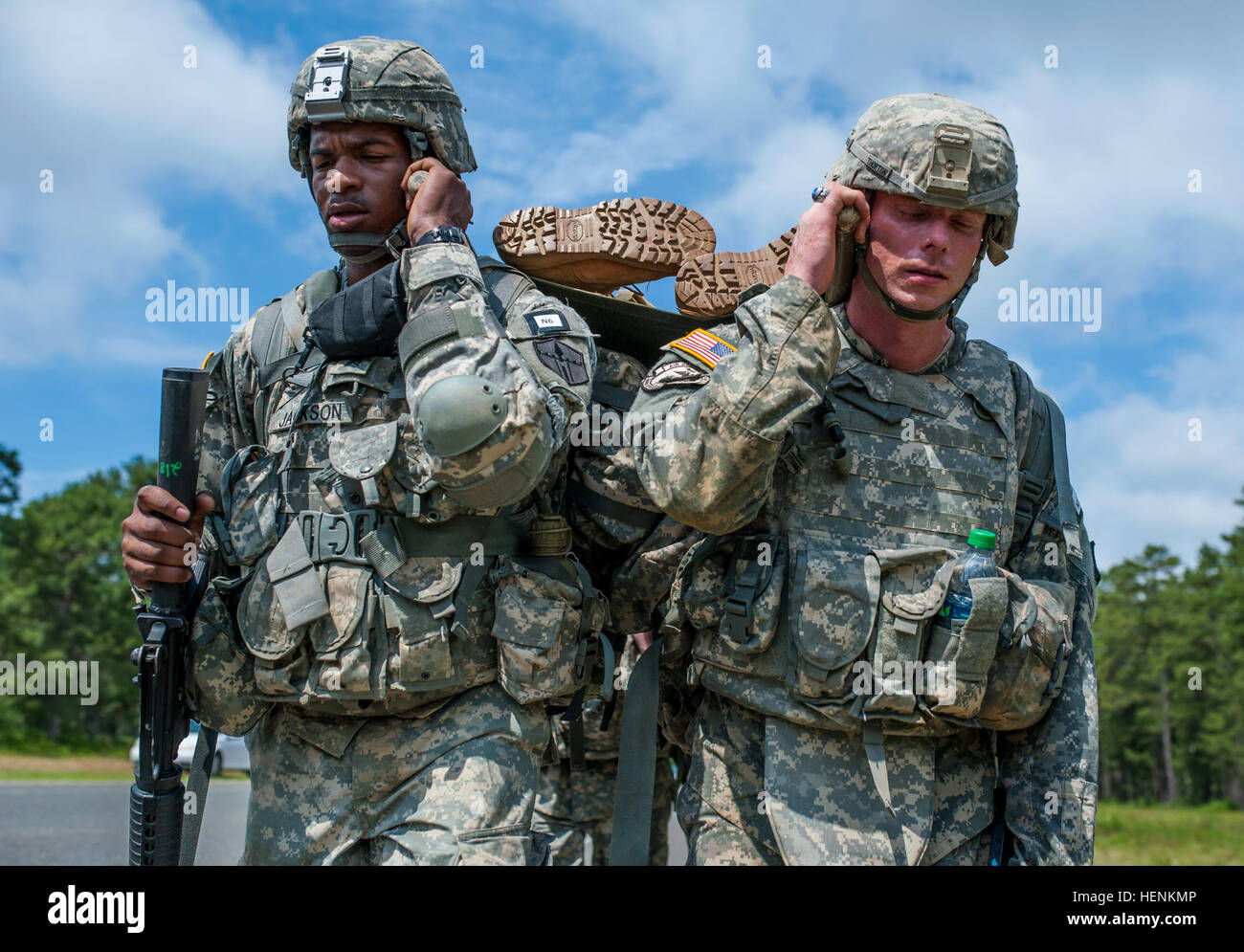 A team of four Soldiers carries a 165-pound dummy which they have to ...