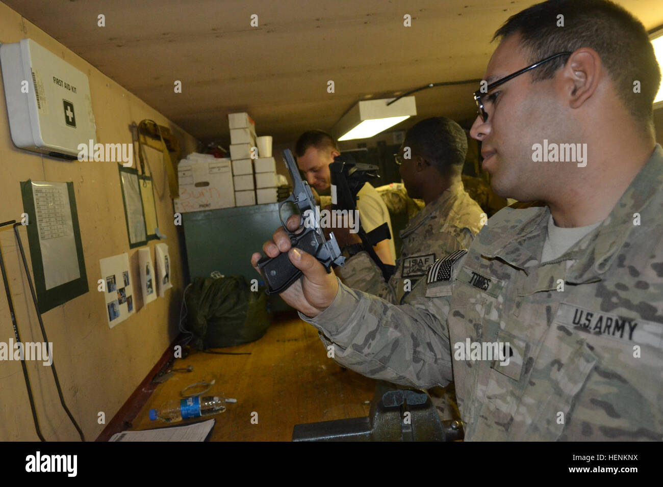 A small arms repairer from the 514th Support Maintenance Company ...