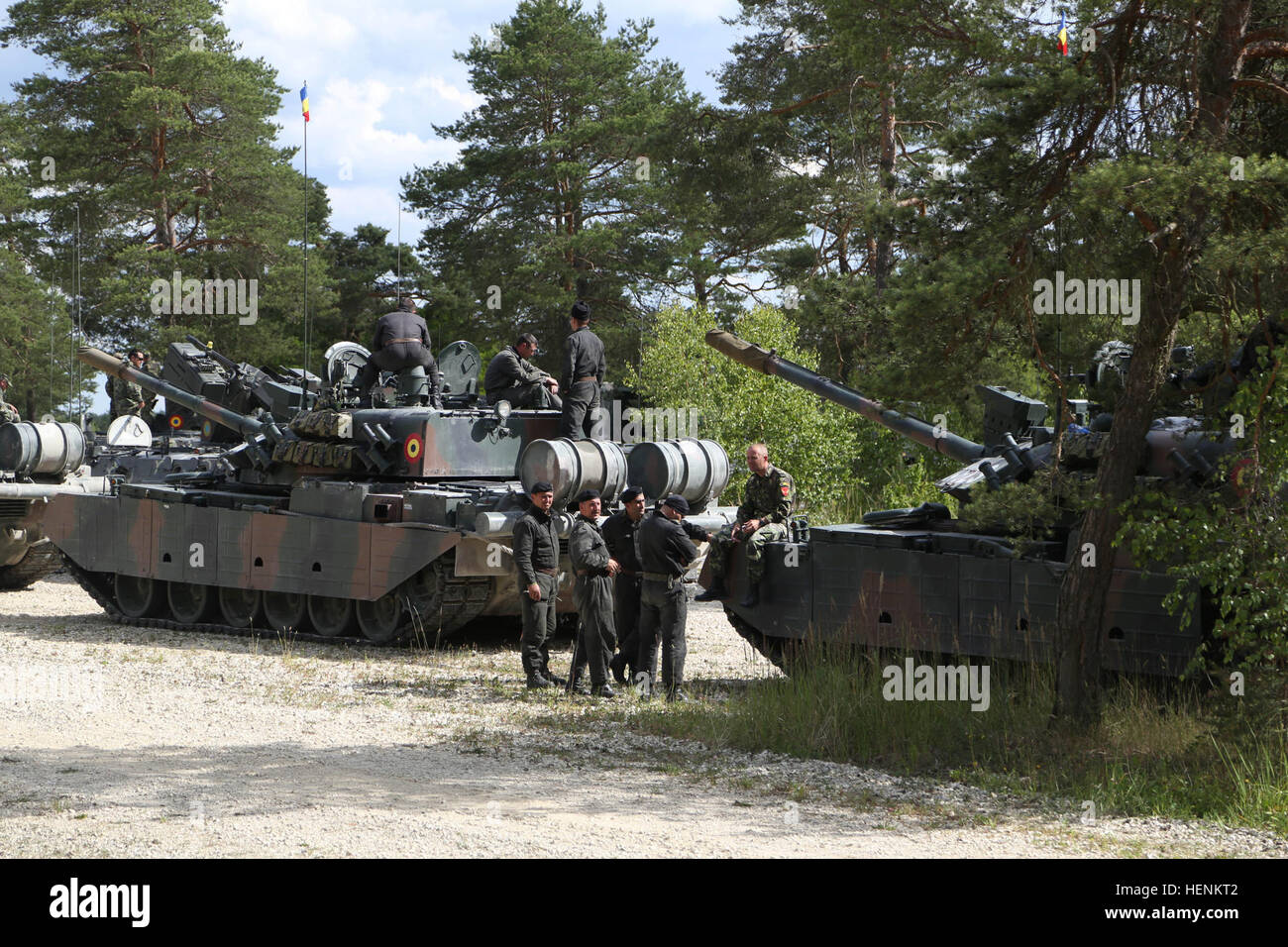 Romanian soldiers in TR-85M1 Bizonul main battle tanks of the 284th ...