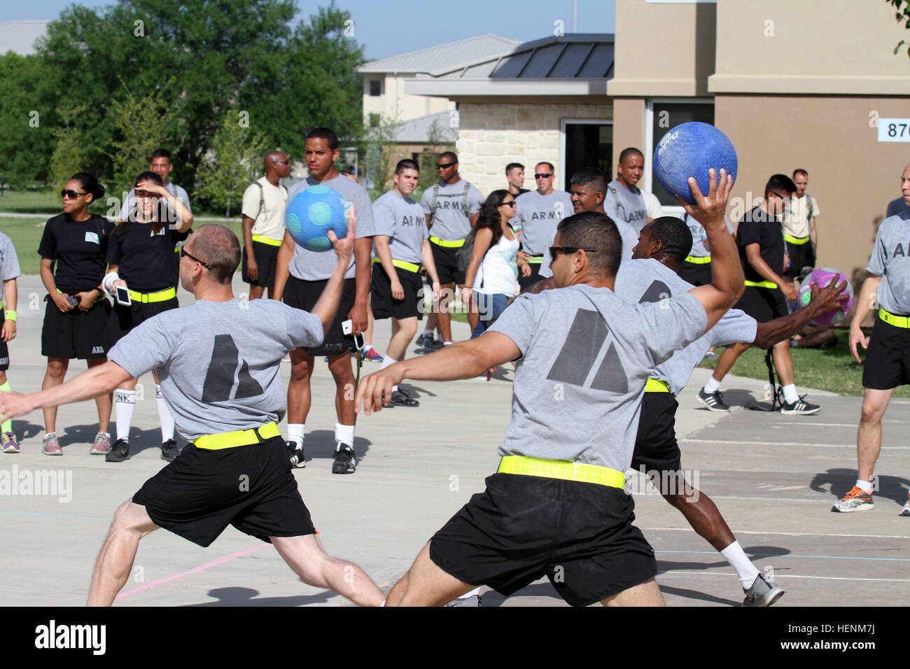 Soldiers prepare to launch rubber balls at the opposing team during the ...