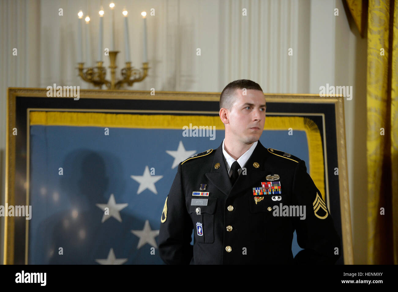 Former Army Staff Sgt. Ryan Pitts stands at parade rest during a Medal ...