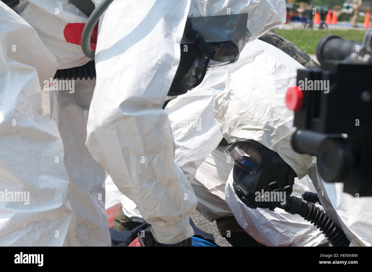 Medics from the 293rd Military Police Company treat a simulated ...